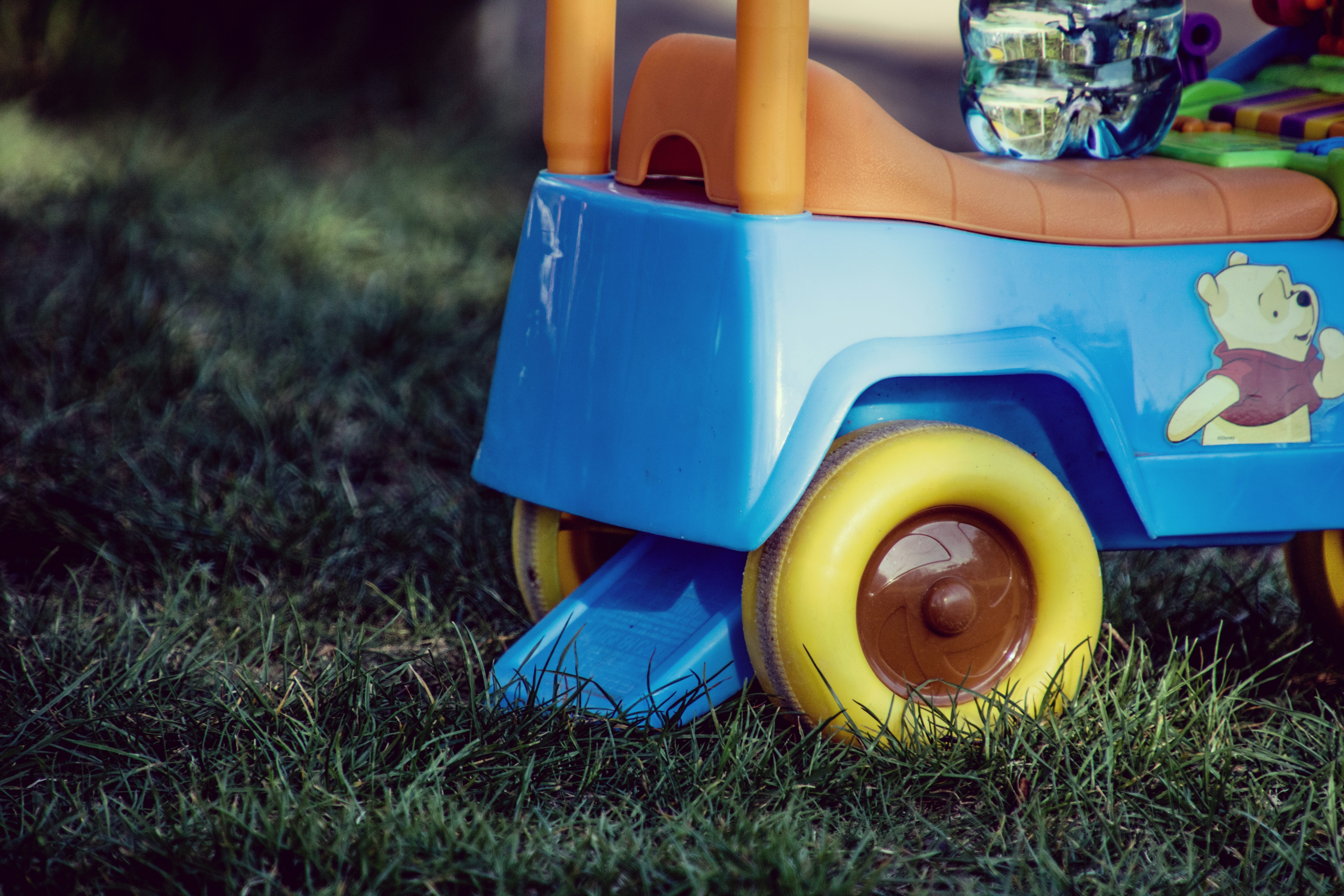 Toddler's blue and brown ride-on toy photo – Free Toy Image on Unsplash