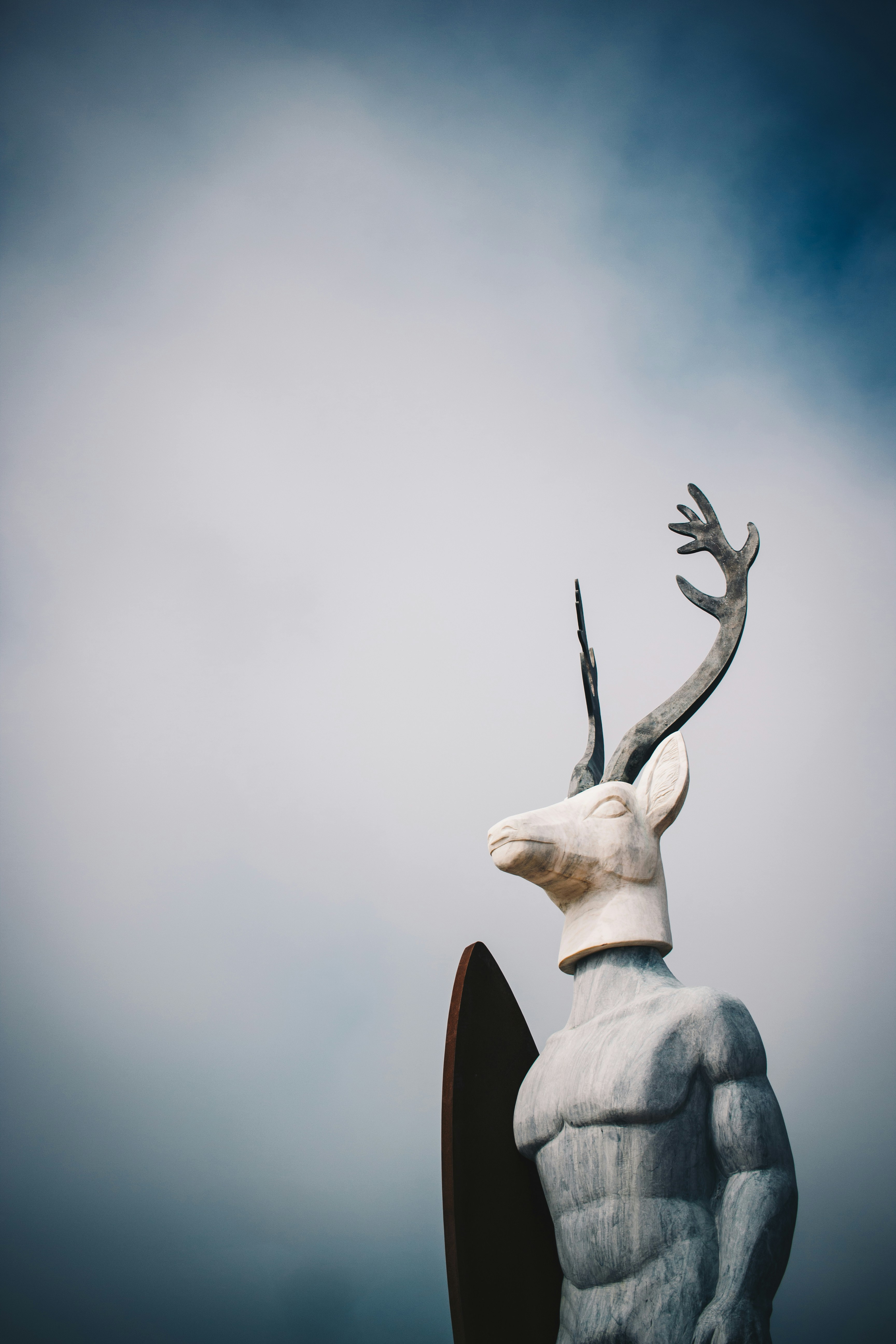 Grey concrete statue photo – Free Grey Image on Unsplash