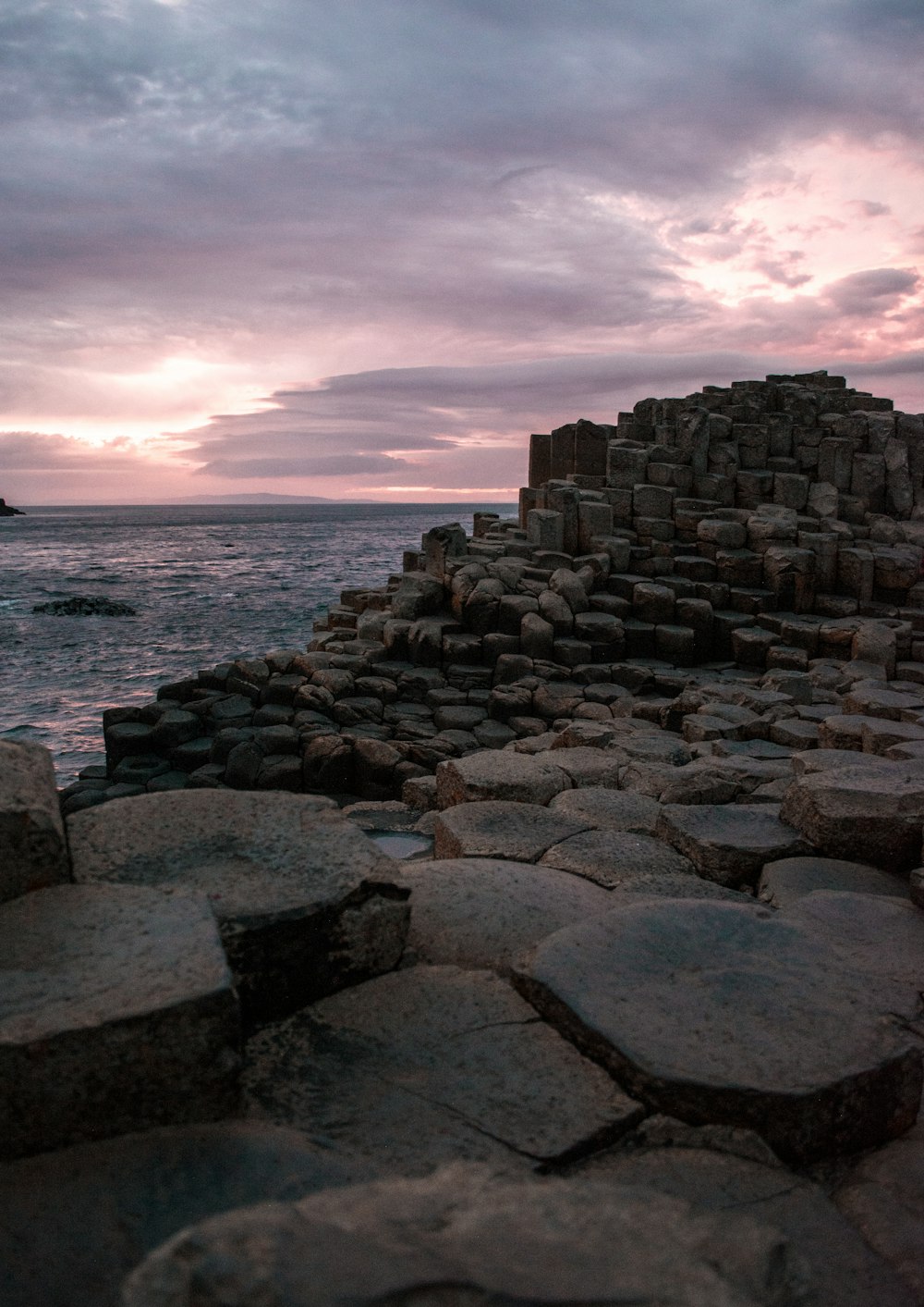 Gray sea cliff under cloudy sky photo – Free Bushmills Image on Unsplash Gray sea cliff under cloudy sky photo – Free Bushmills Image on Unsplash