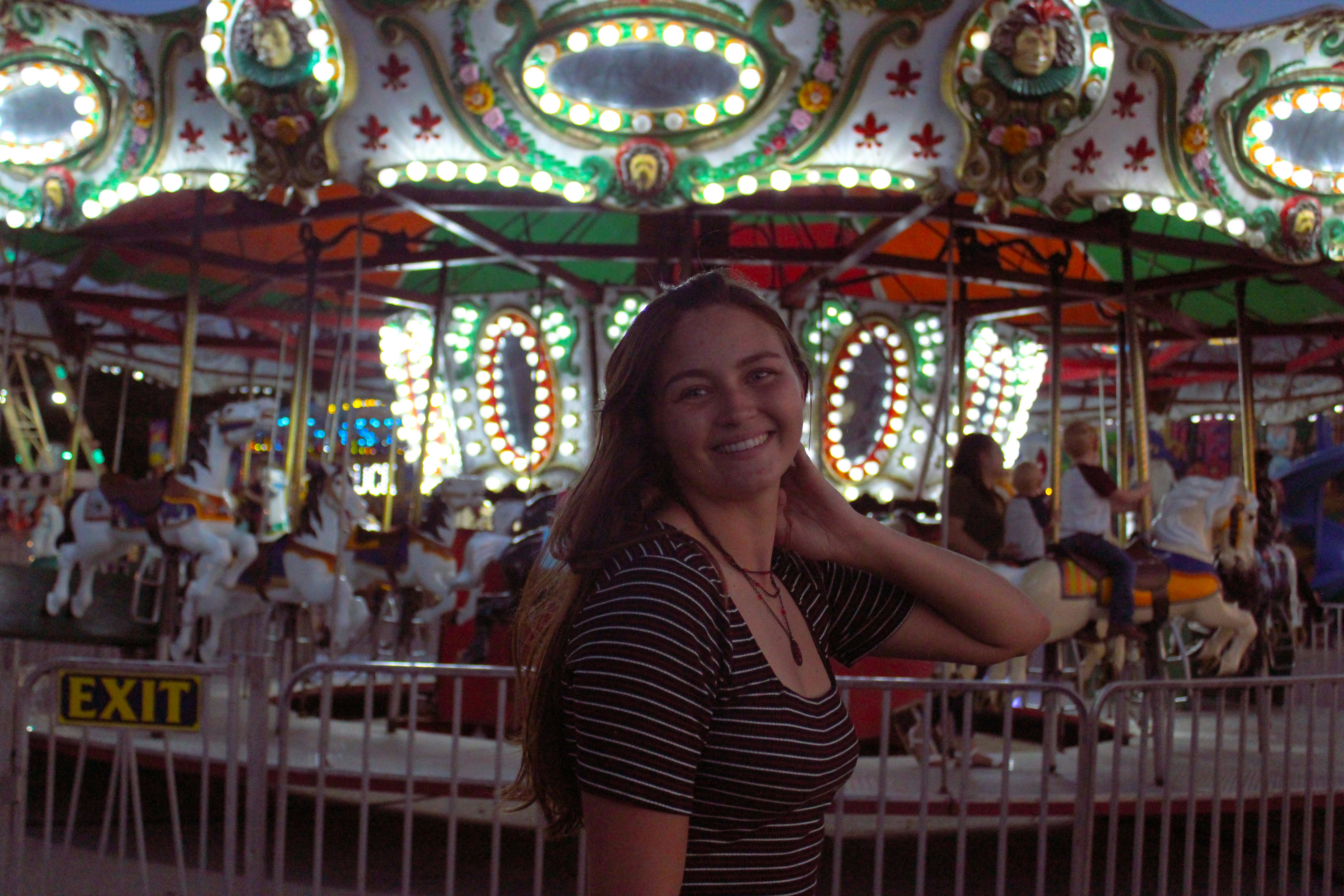 Smile Beneath Neon Carousel Rings