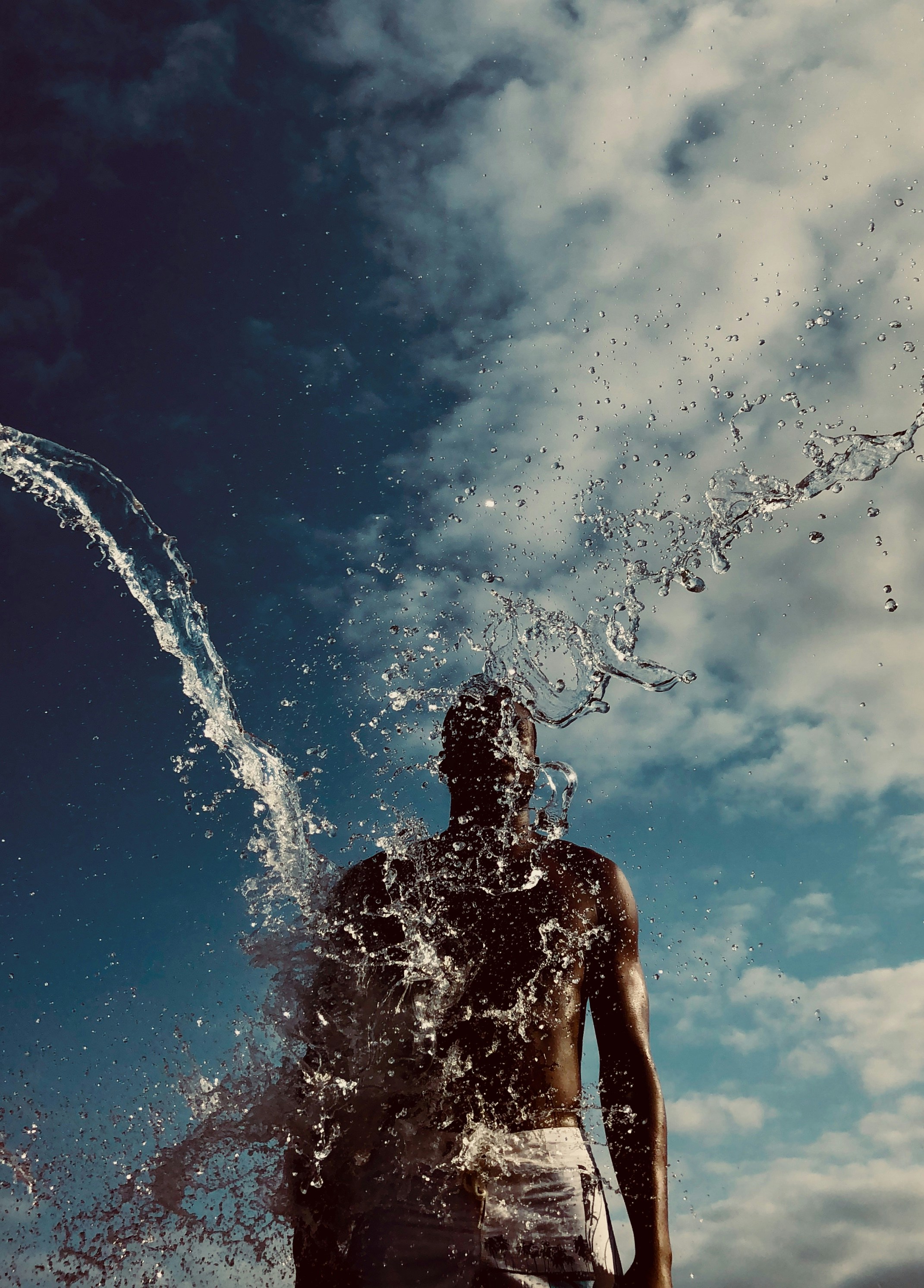 Man splashing with water photo – Free Grey Image on Unsplash