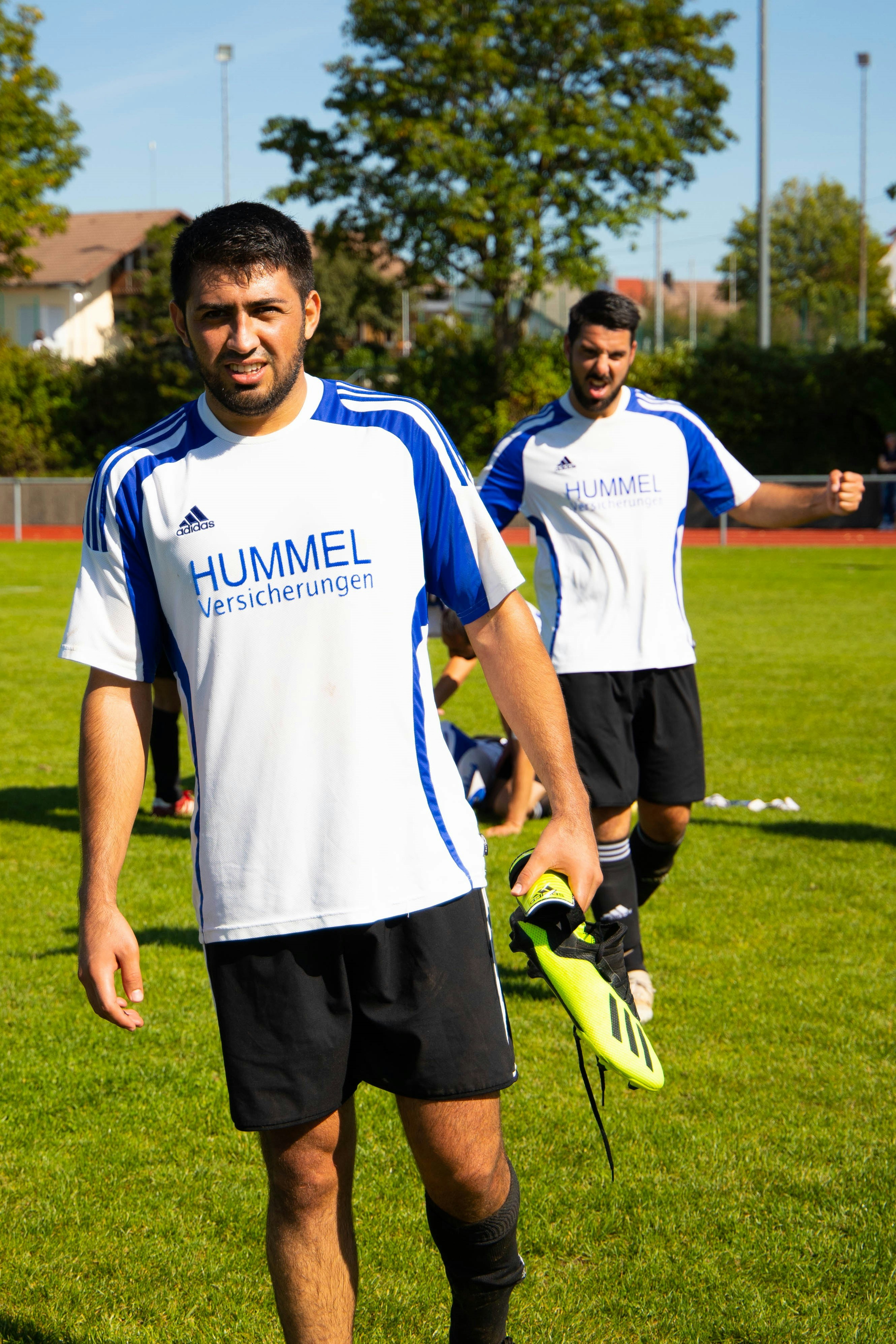 Two men standing in green field during daytime photo – Free Böhmenkirch ...
