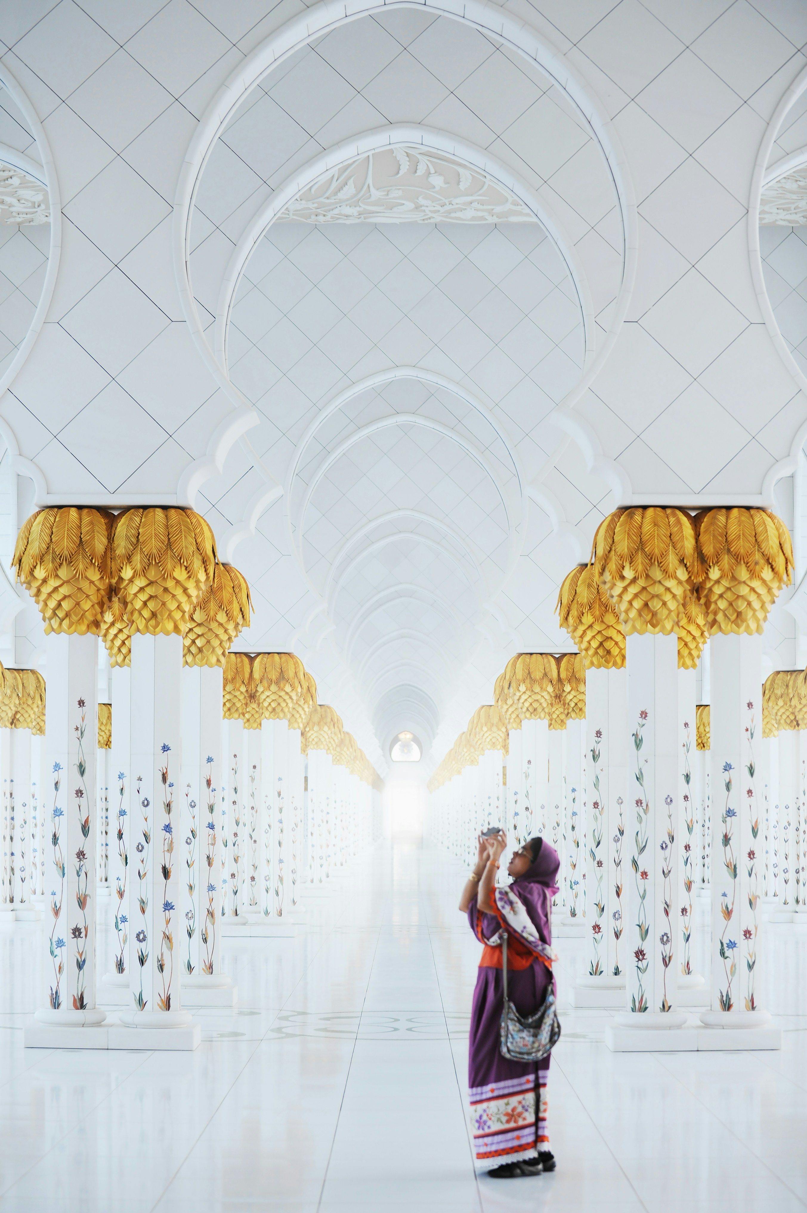 Woman standing inside a prayer temple photo – Free Sheikh zayed grand ...