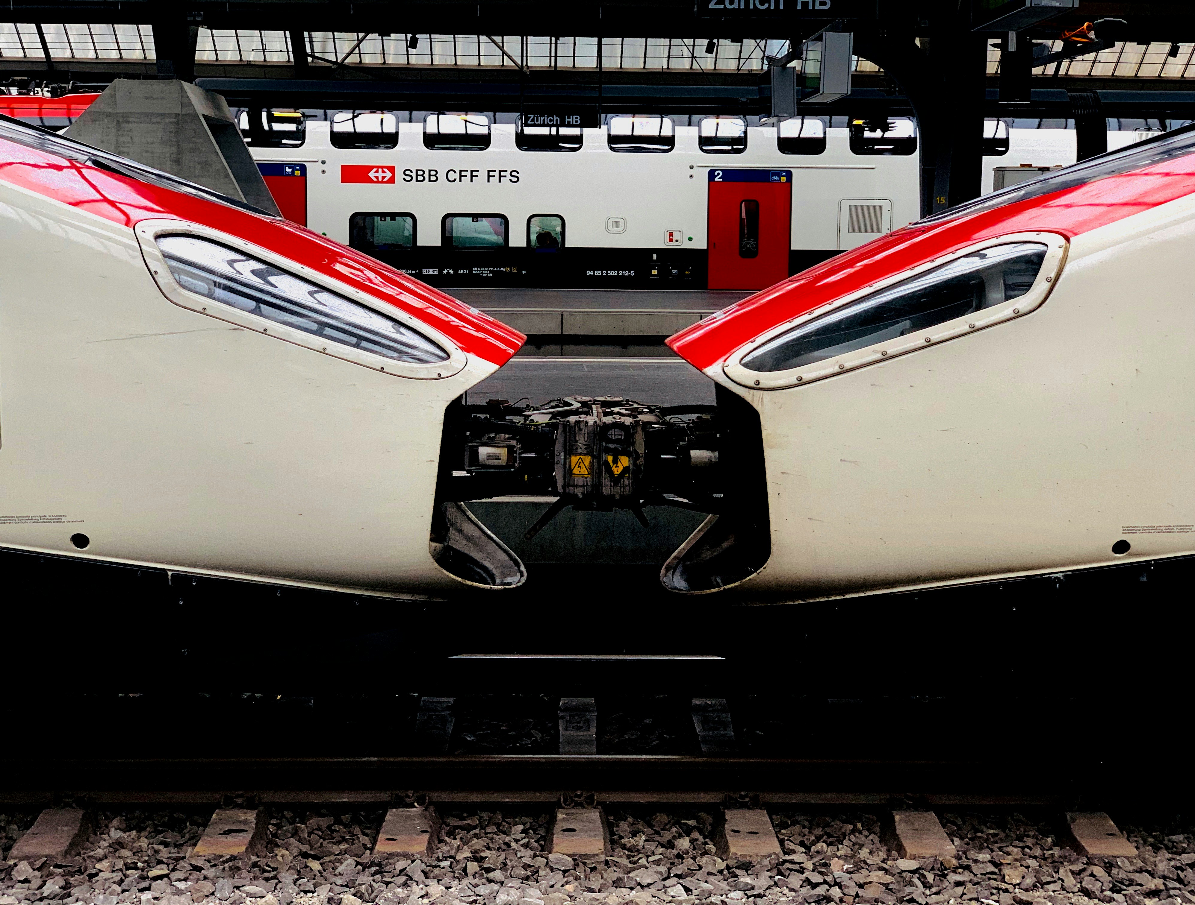 White and red train photography photo – Free Train track Image on Unsplash