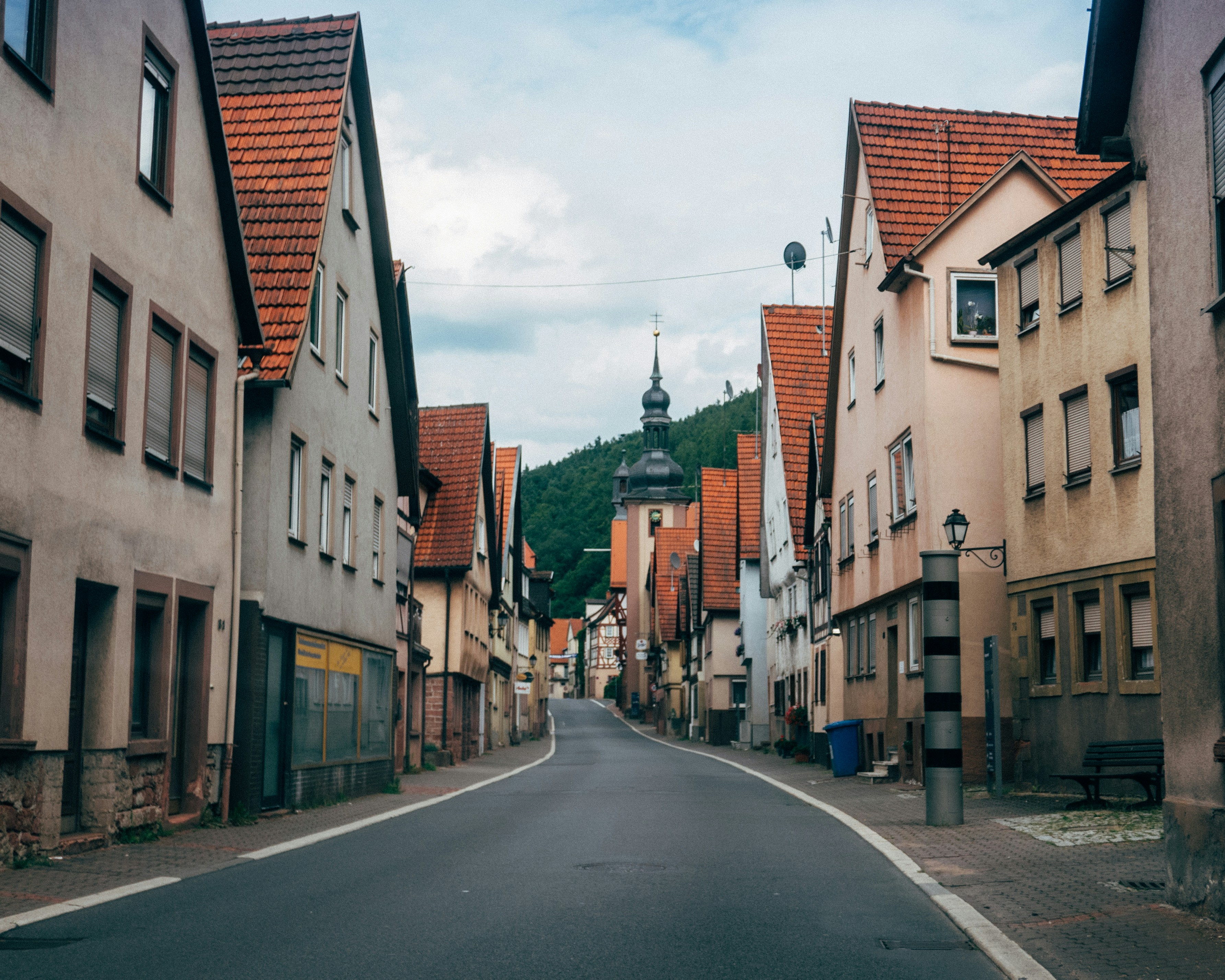 Midtown Lane: Quiet Street Bounded by Red-Tiled Roofs