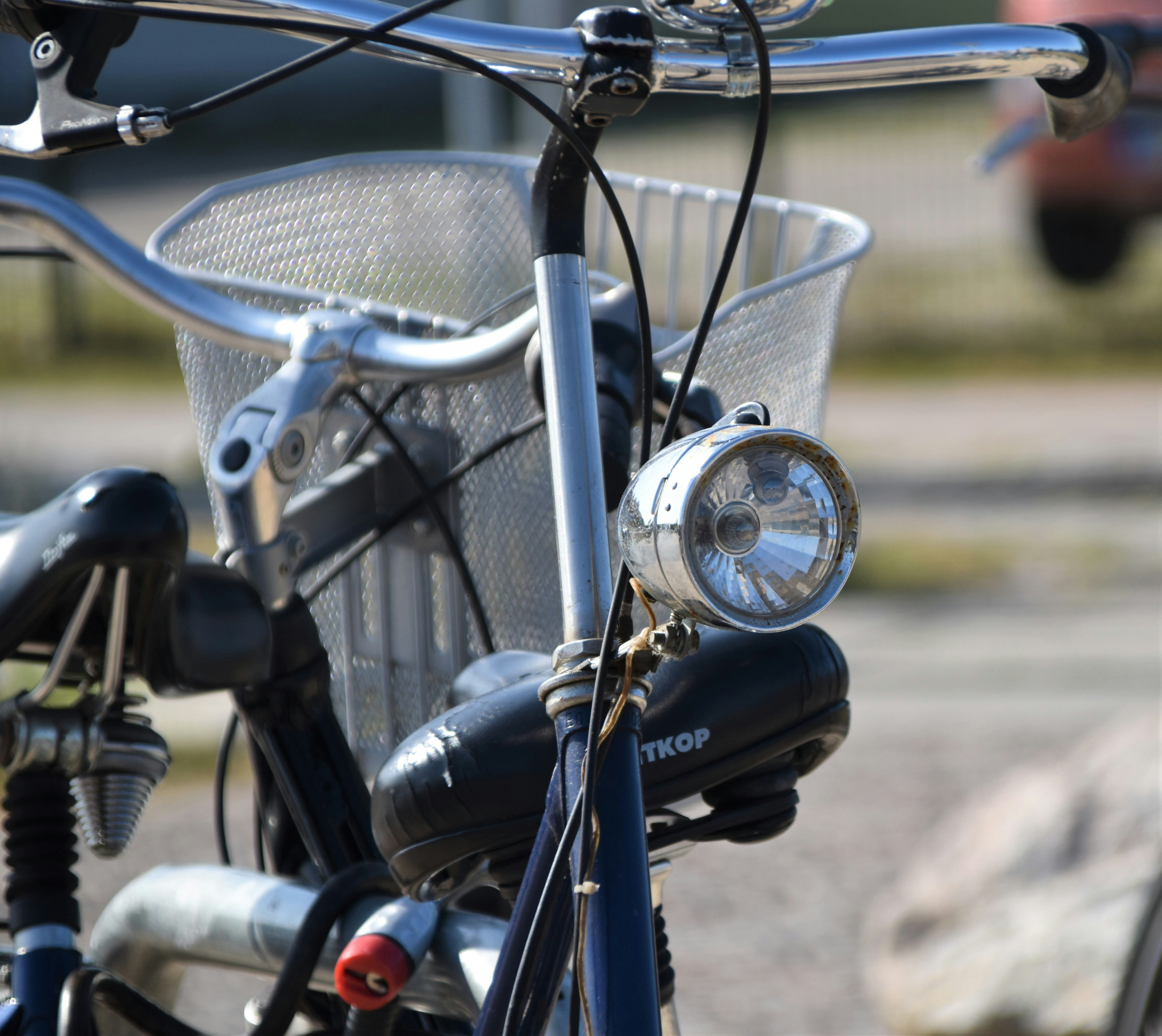 Morning Glint on a Vintage City Bike: Front End in Focus
