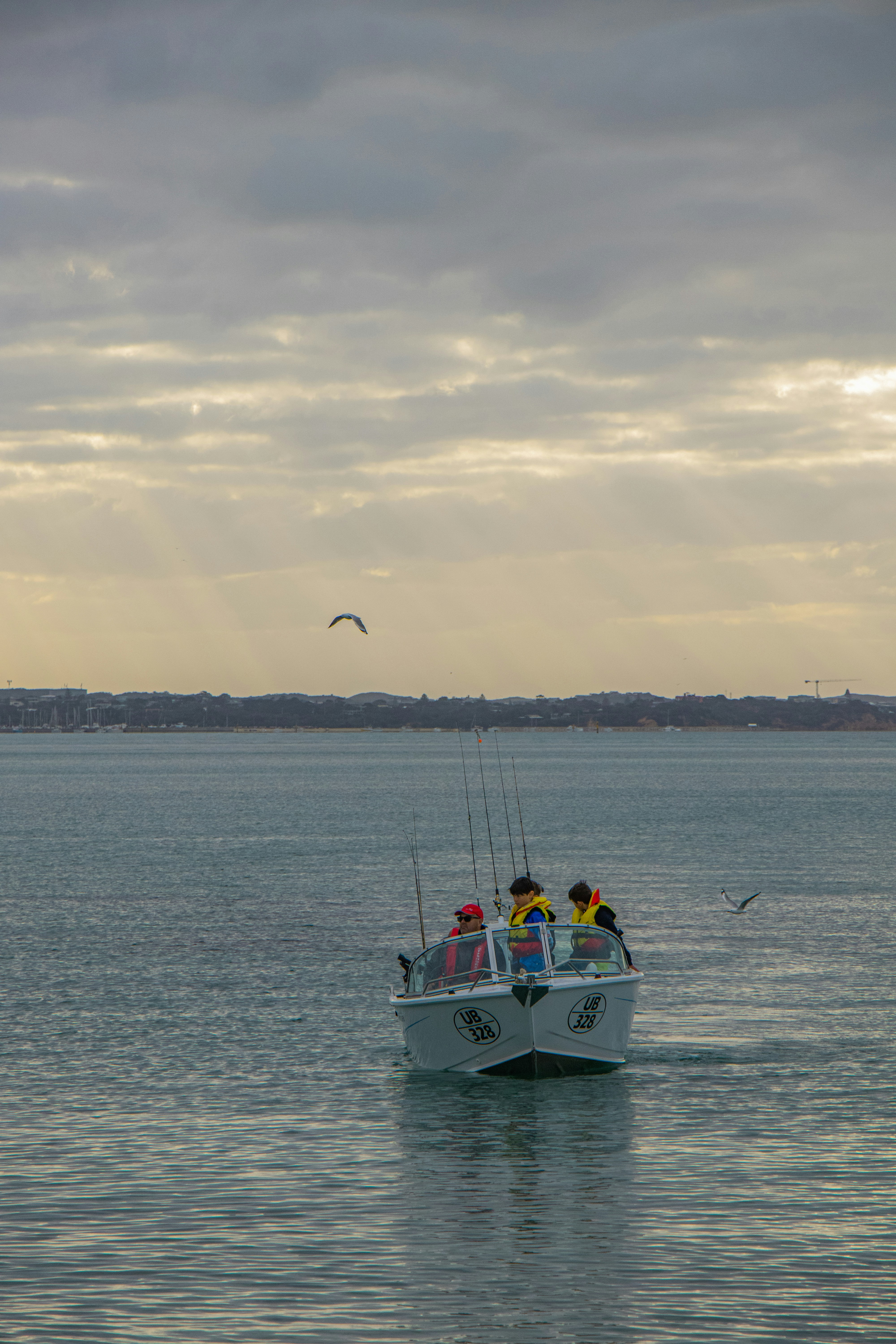 Coastal Fishermen in a Quiet Horizon