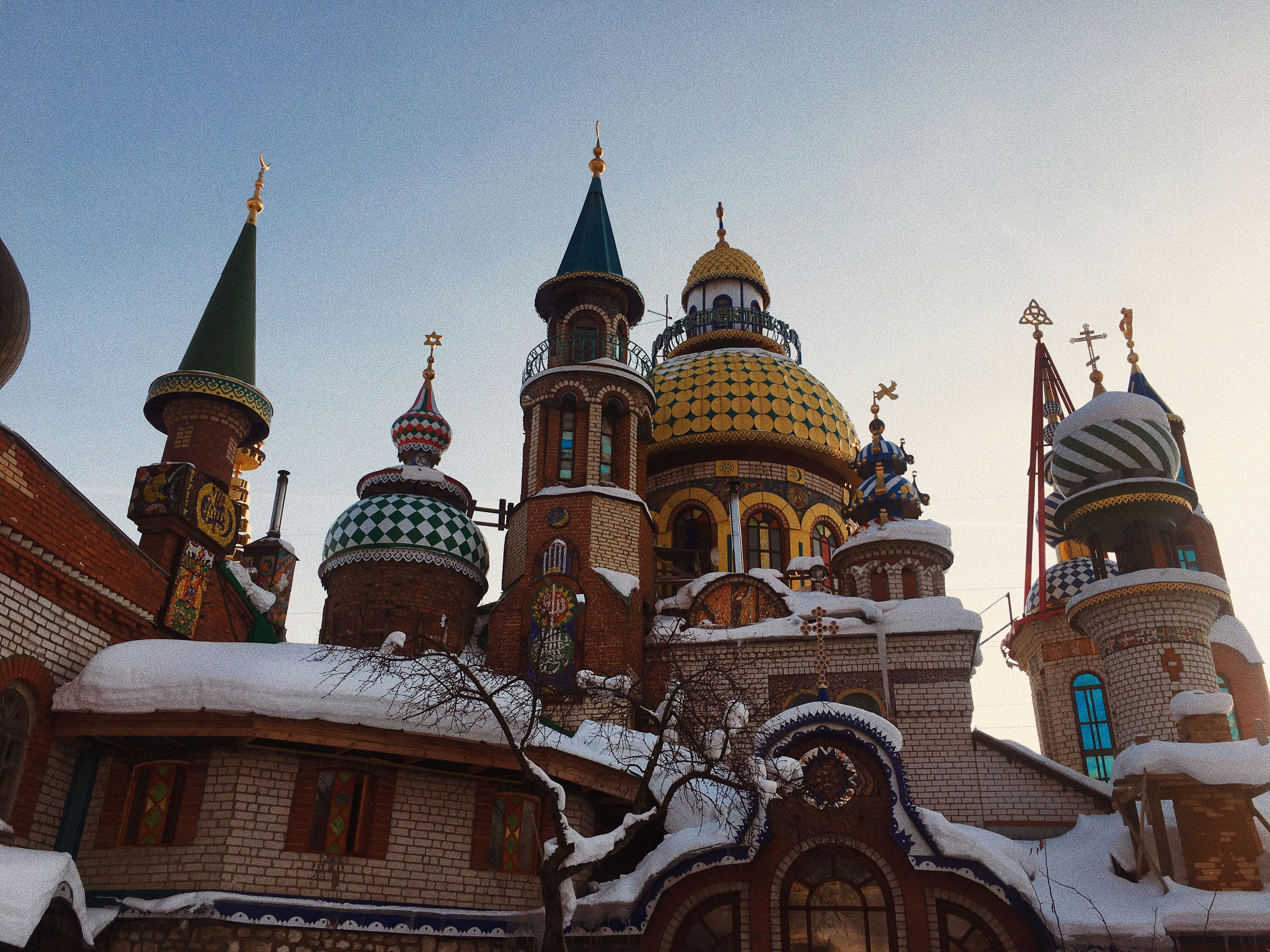 snow covered building during day