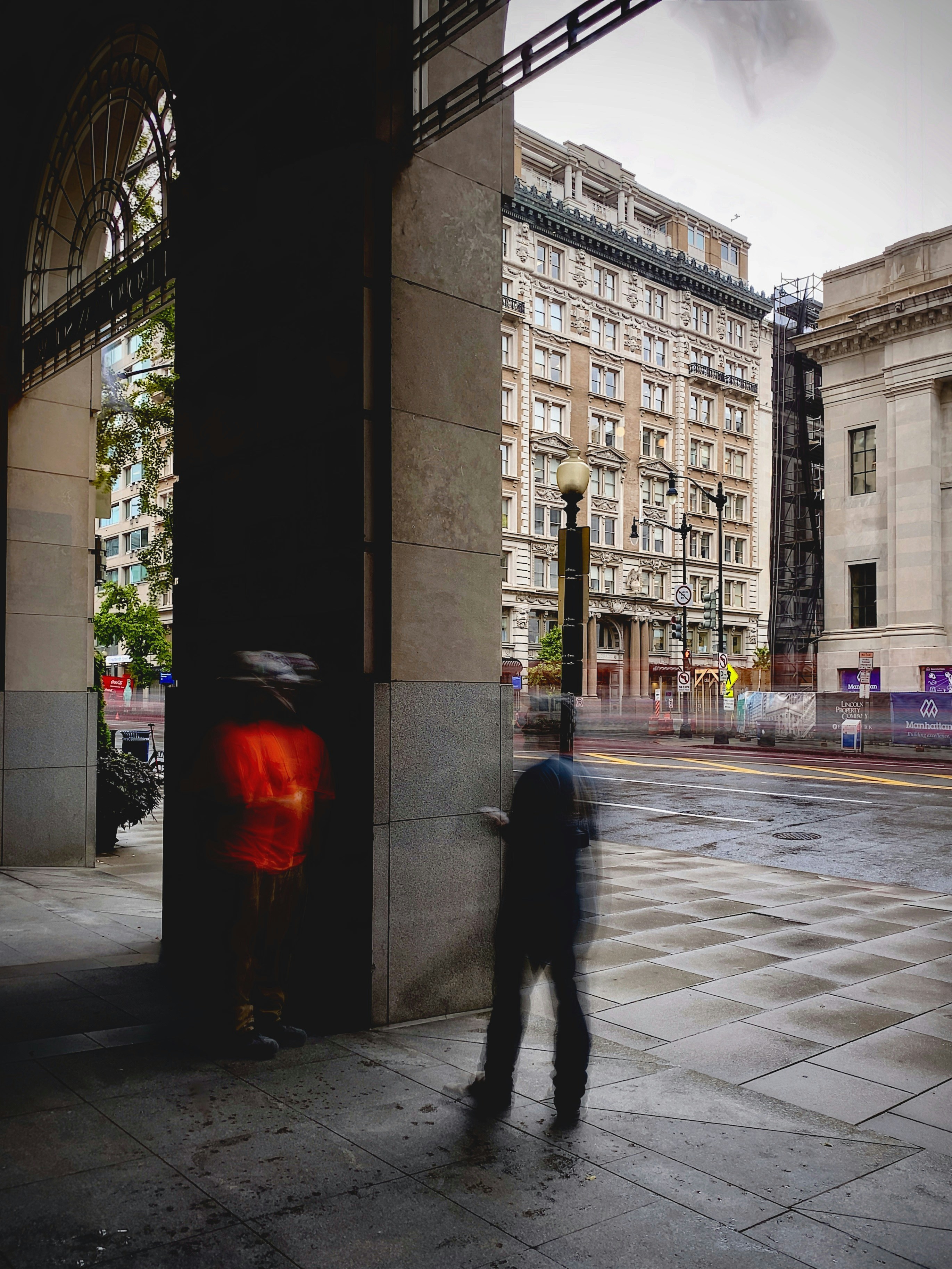 two persons in building