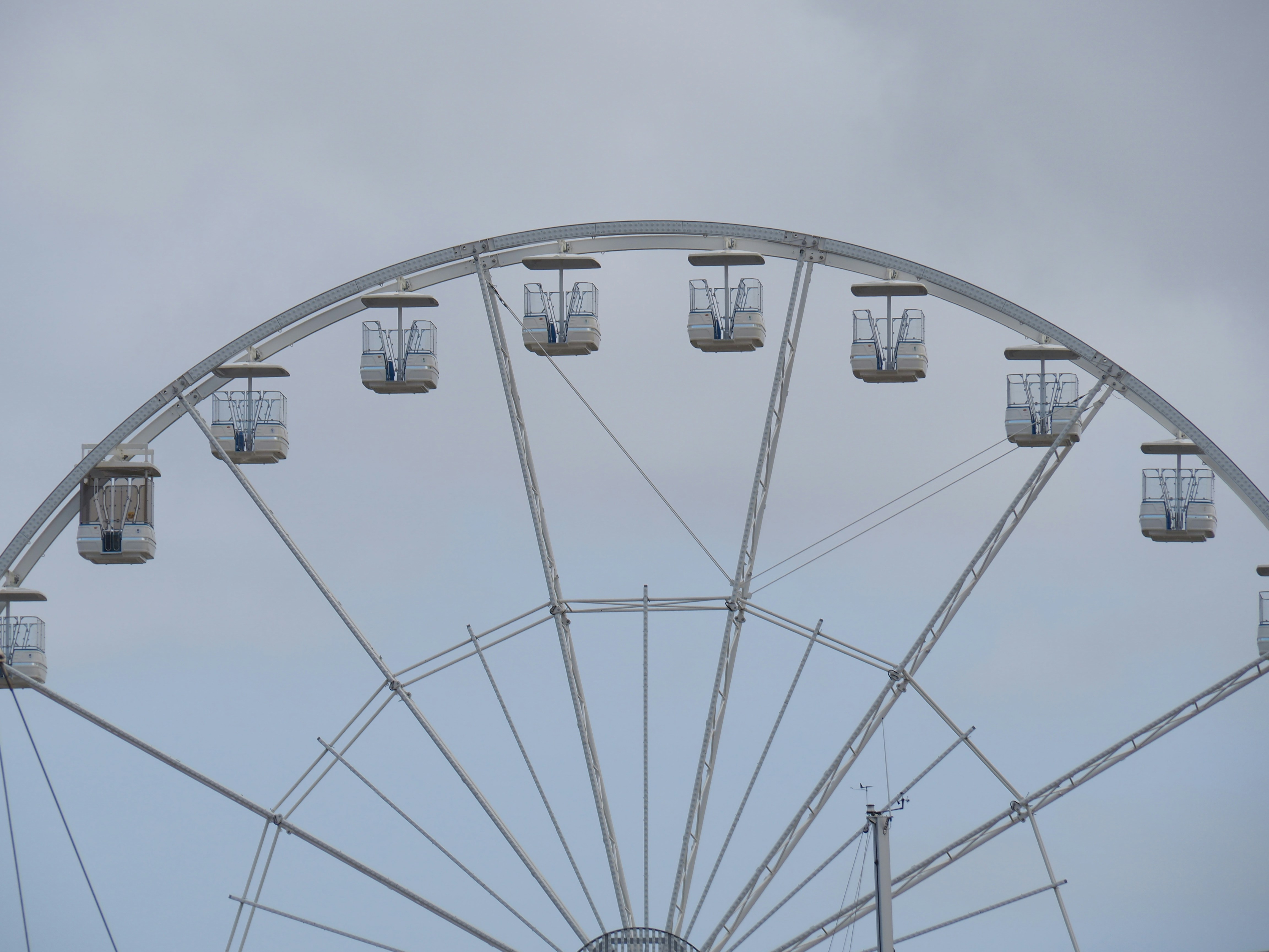 Converging Spokes under Overcast: A Ferris Wheel Slice
