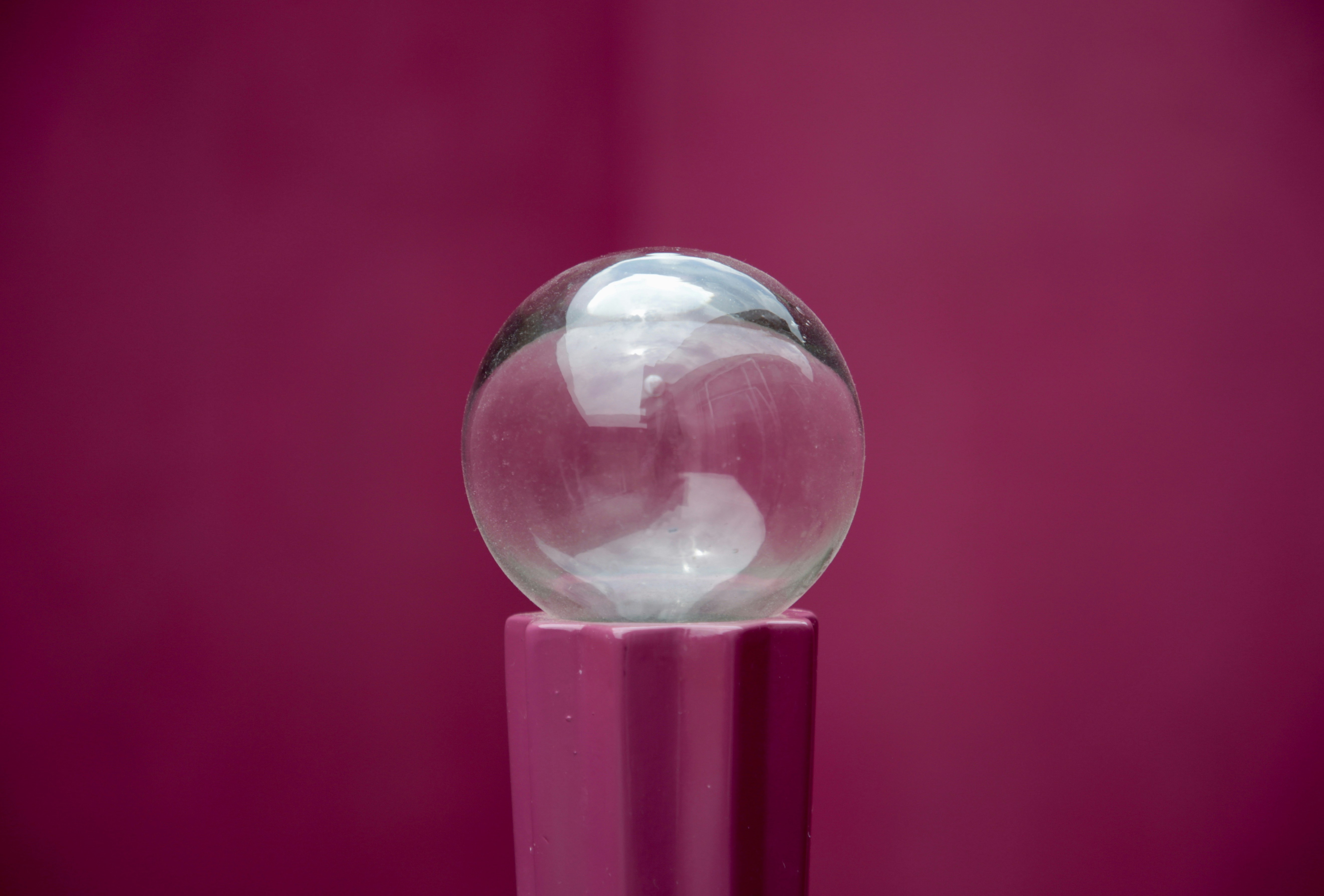 Crystal Ball on a Magenta Pedestal