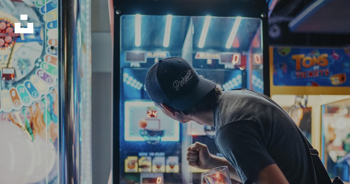 Girl Playing Arcade Game Photo Free Person Image On Unsplash