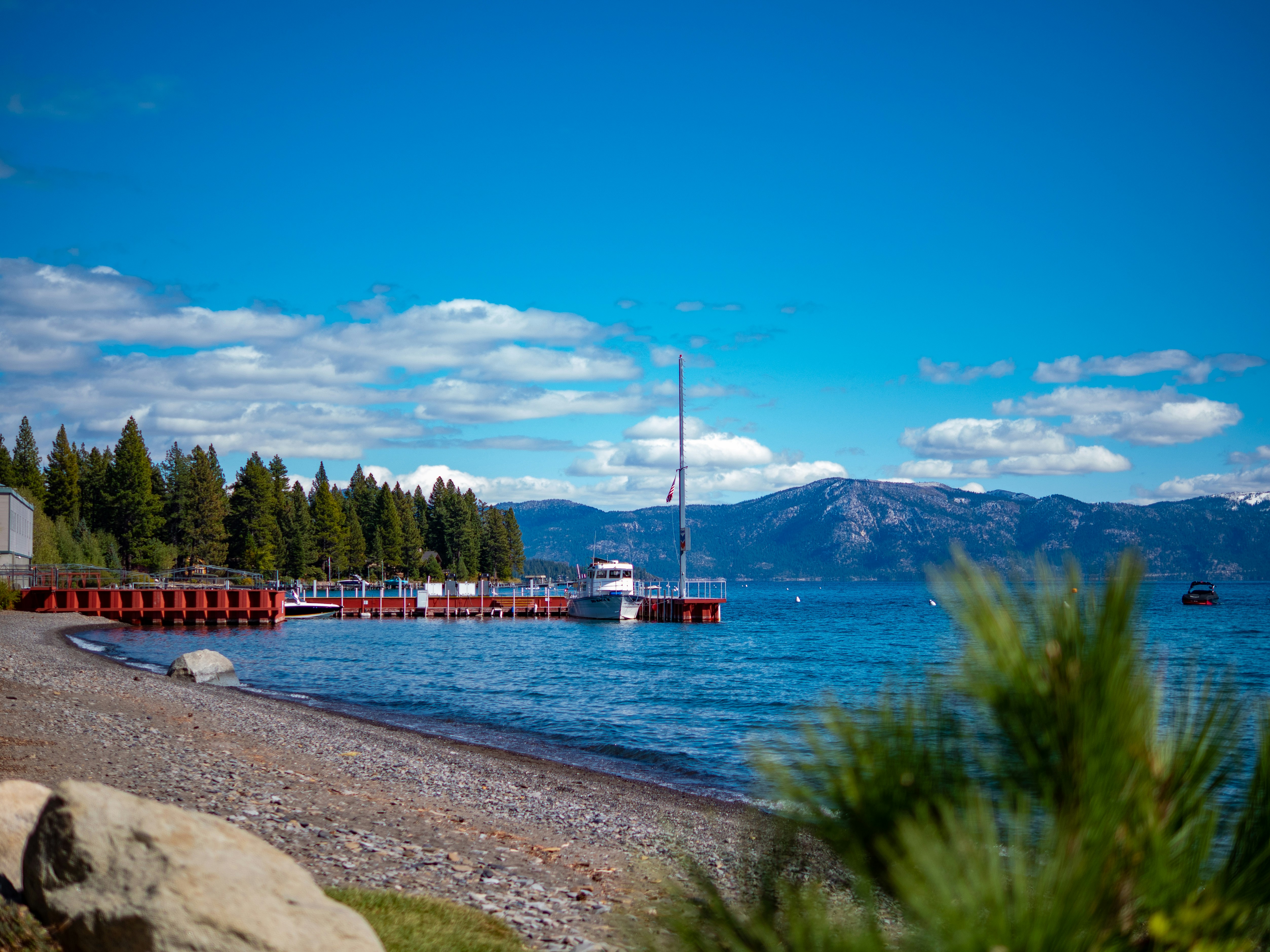Boat beside dock photo – Free Blue Image on Unsplash