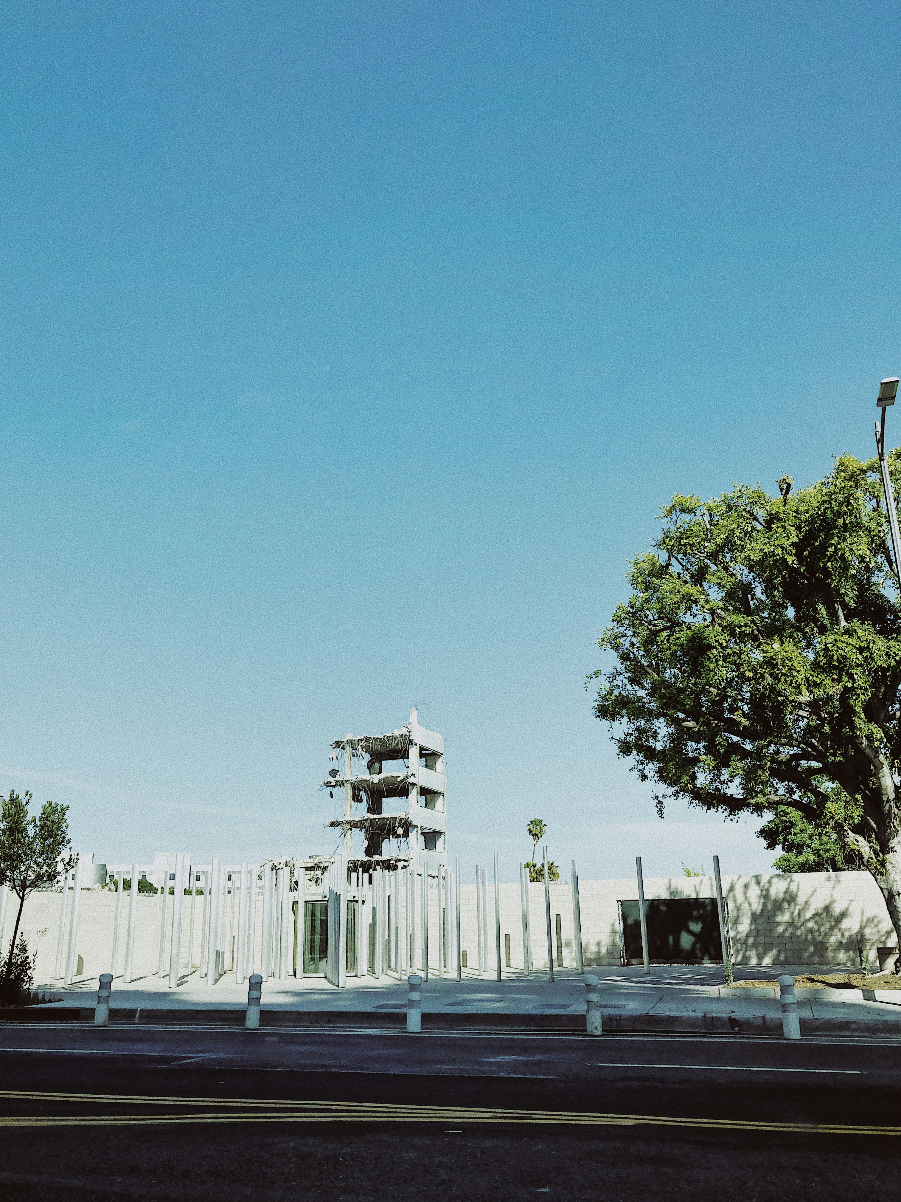 Deserted Gatehouse Beneath an Expanding Sky