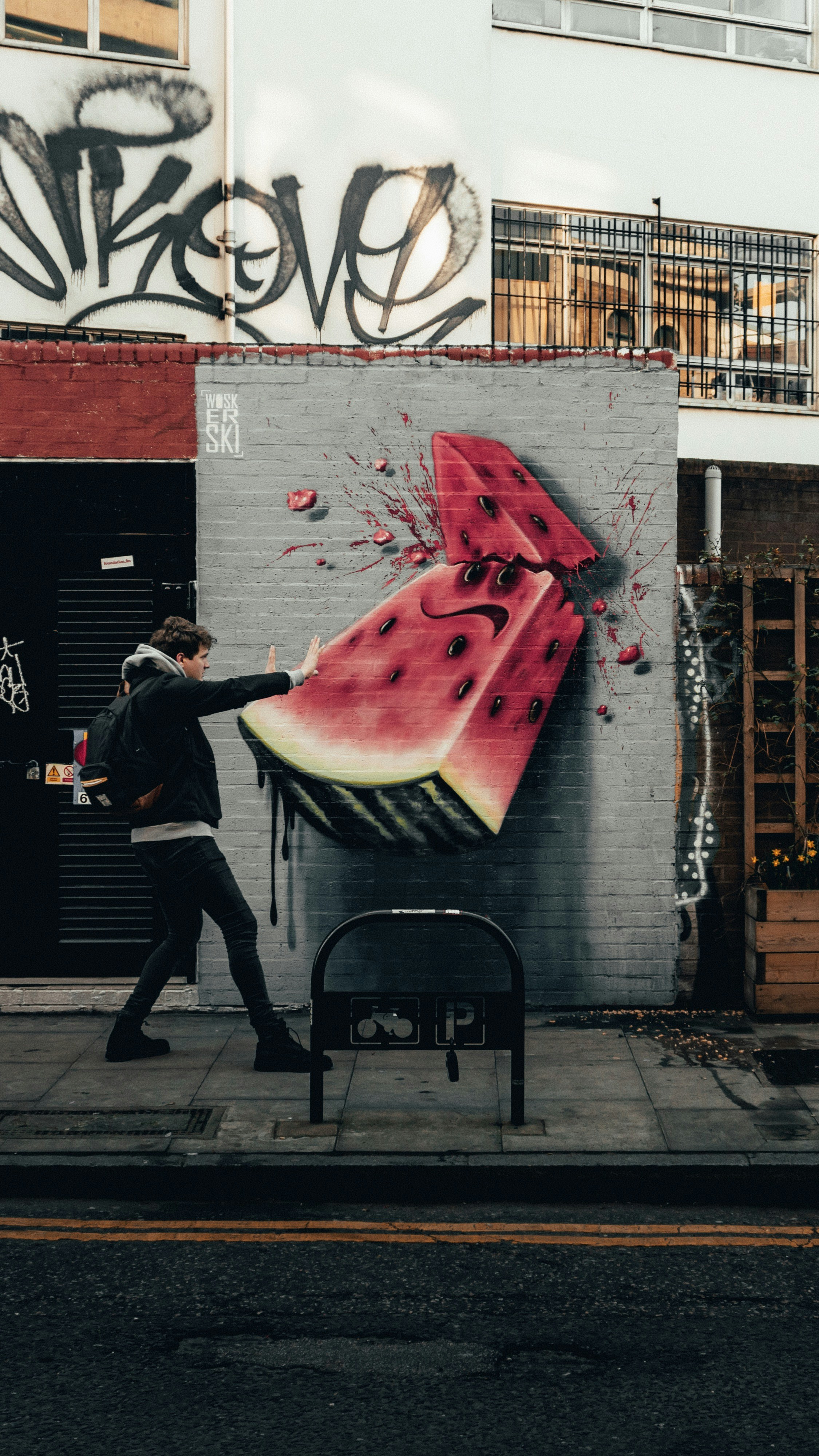 Watermelon on the Wall: Street Art Meets a Moving Pedestrian