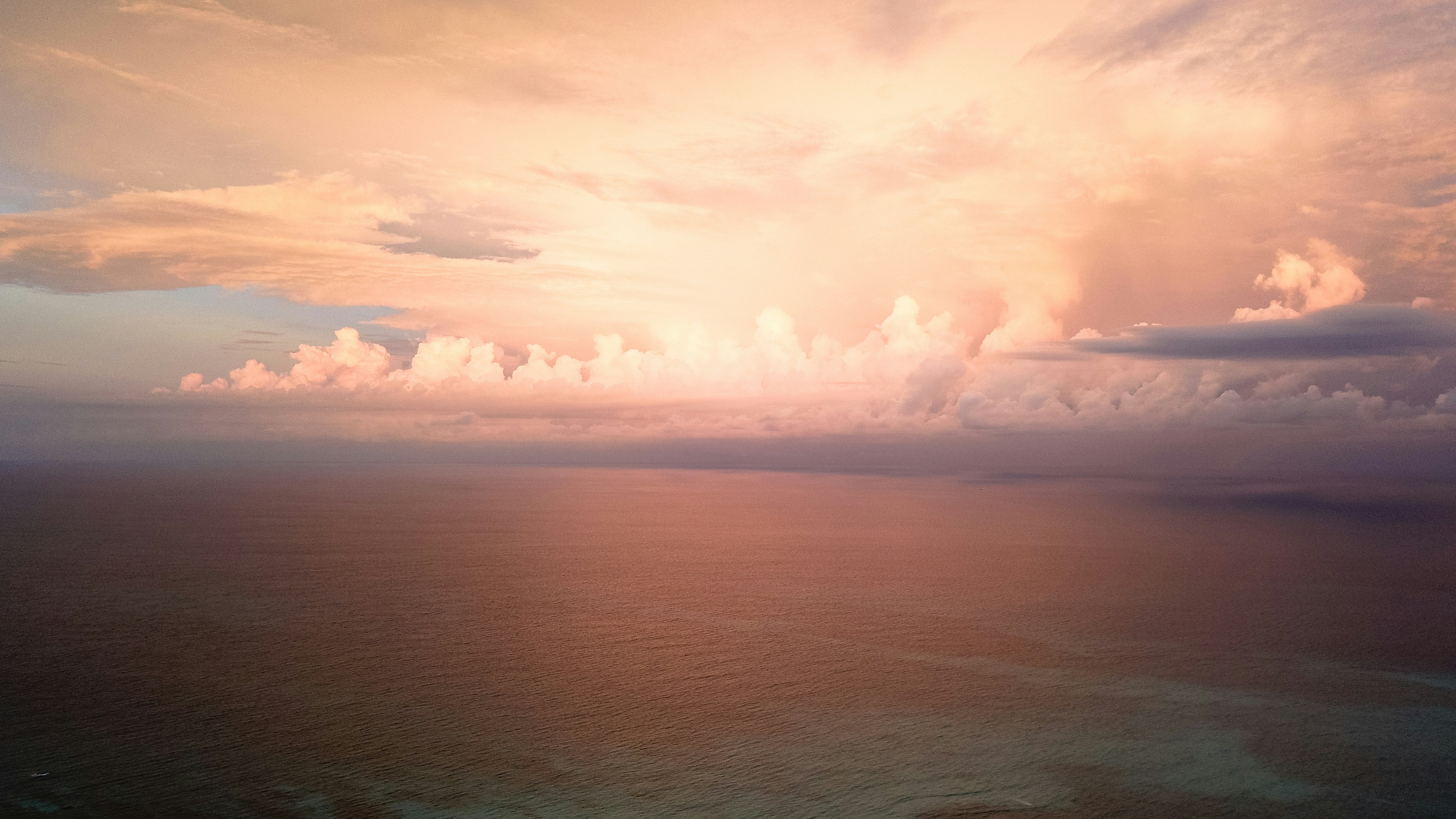 A large body of water under a cloudy sky photo – Free Sabah Image on ...