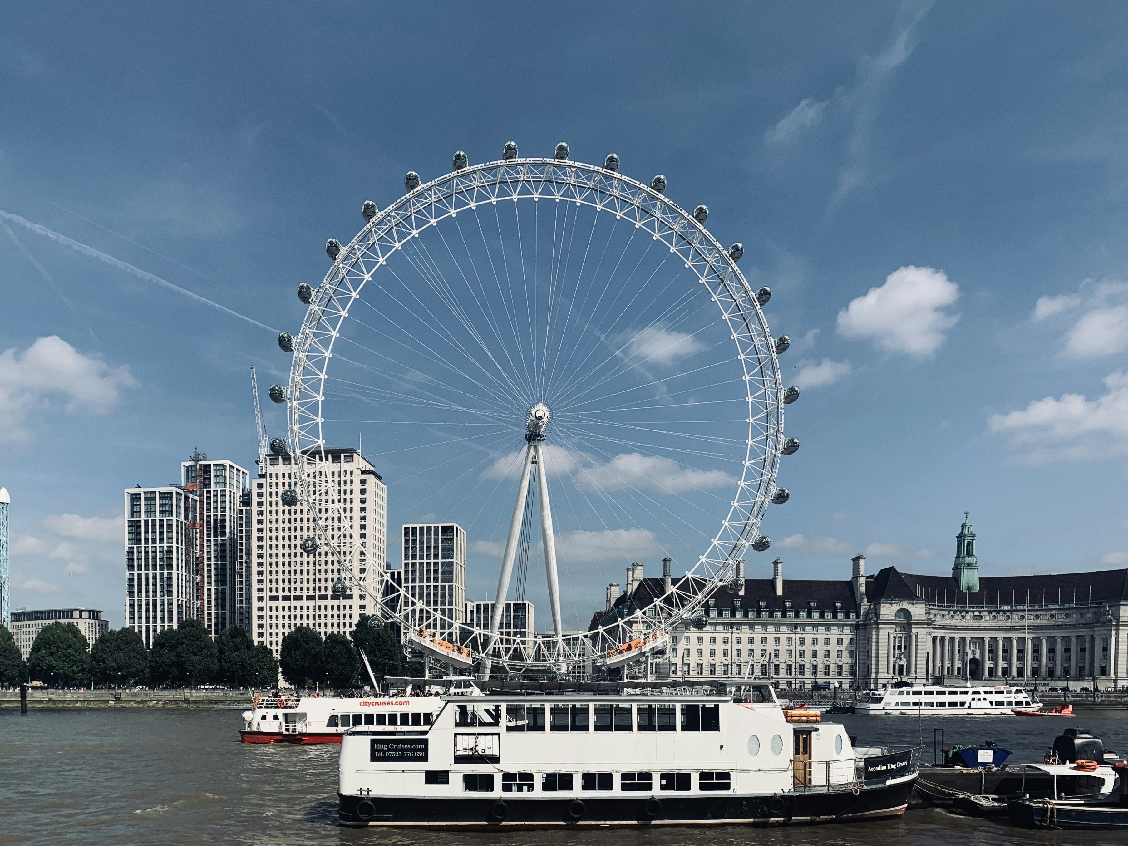 Orbital Thames: The London Eye Anchoring a Sunlit Riverside Scene
