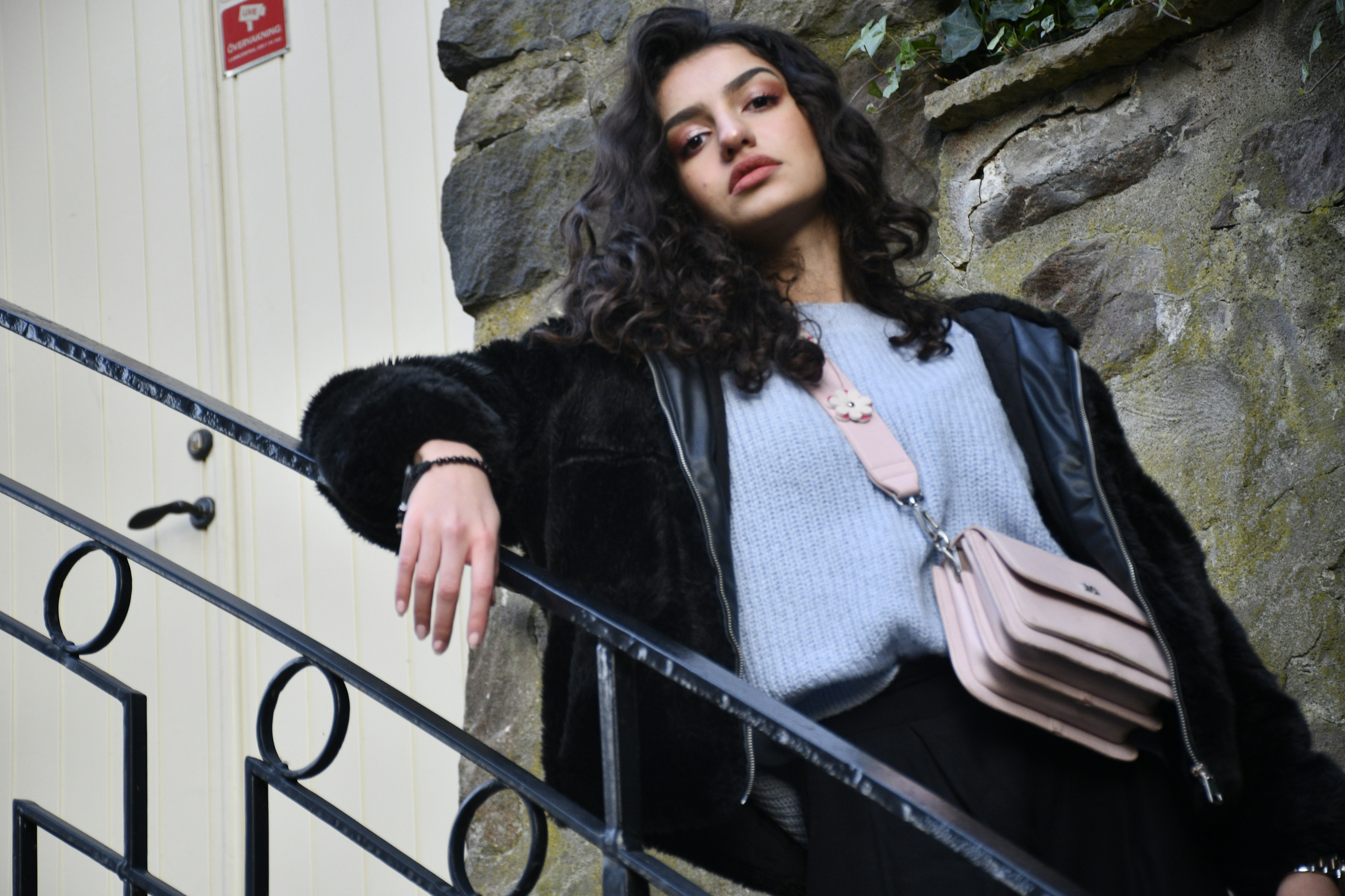 Urban Elegance: A Moment on the Stairway