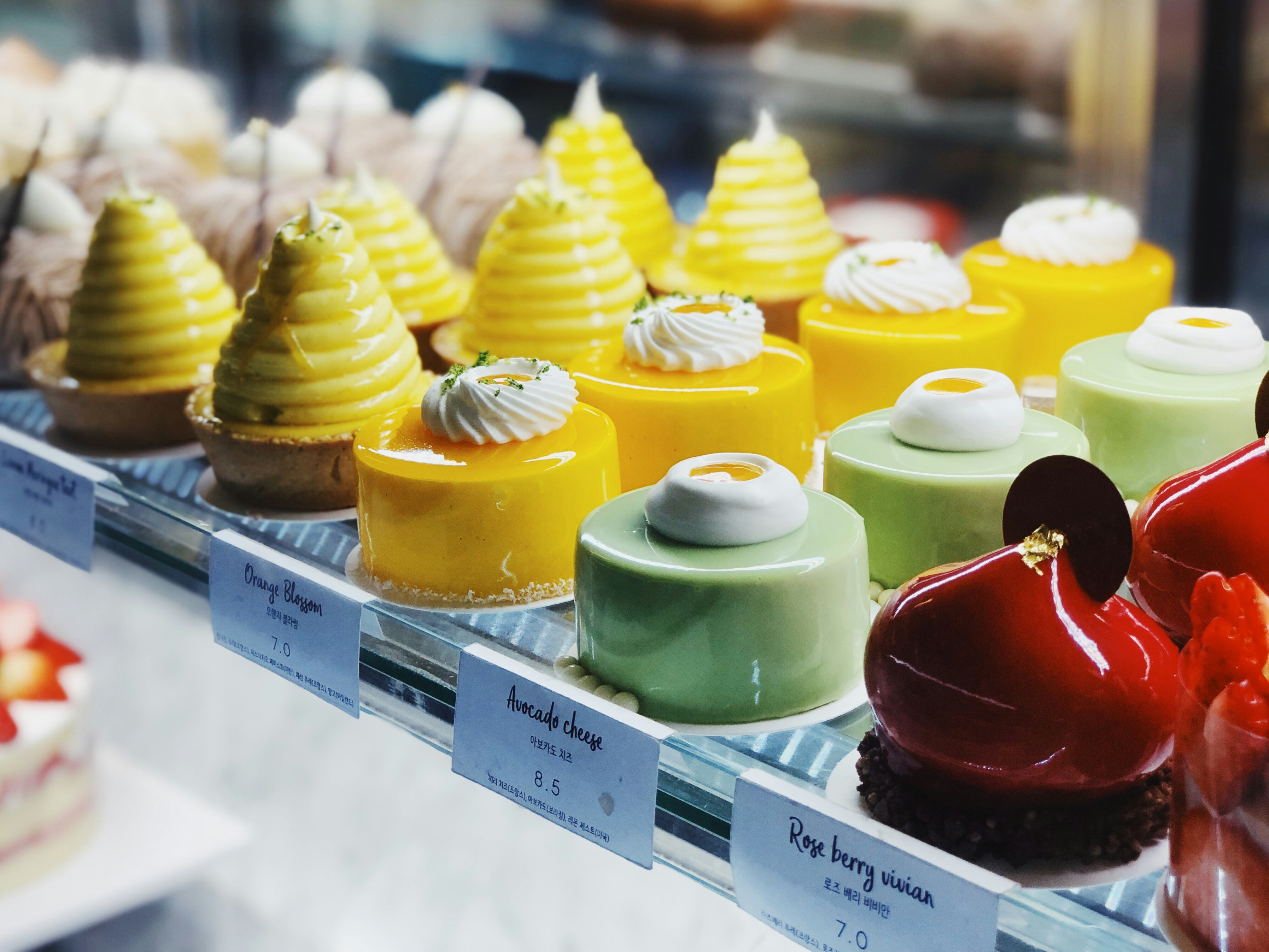 Cakes on display during daytime photo – Free Yellow Image on Unsplash