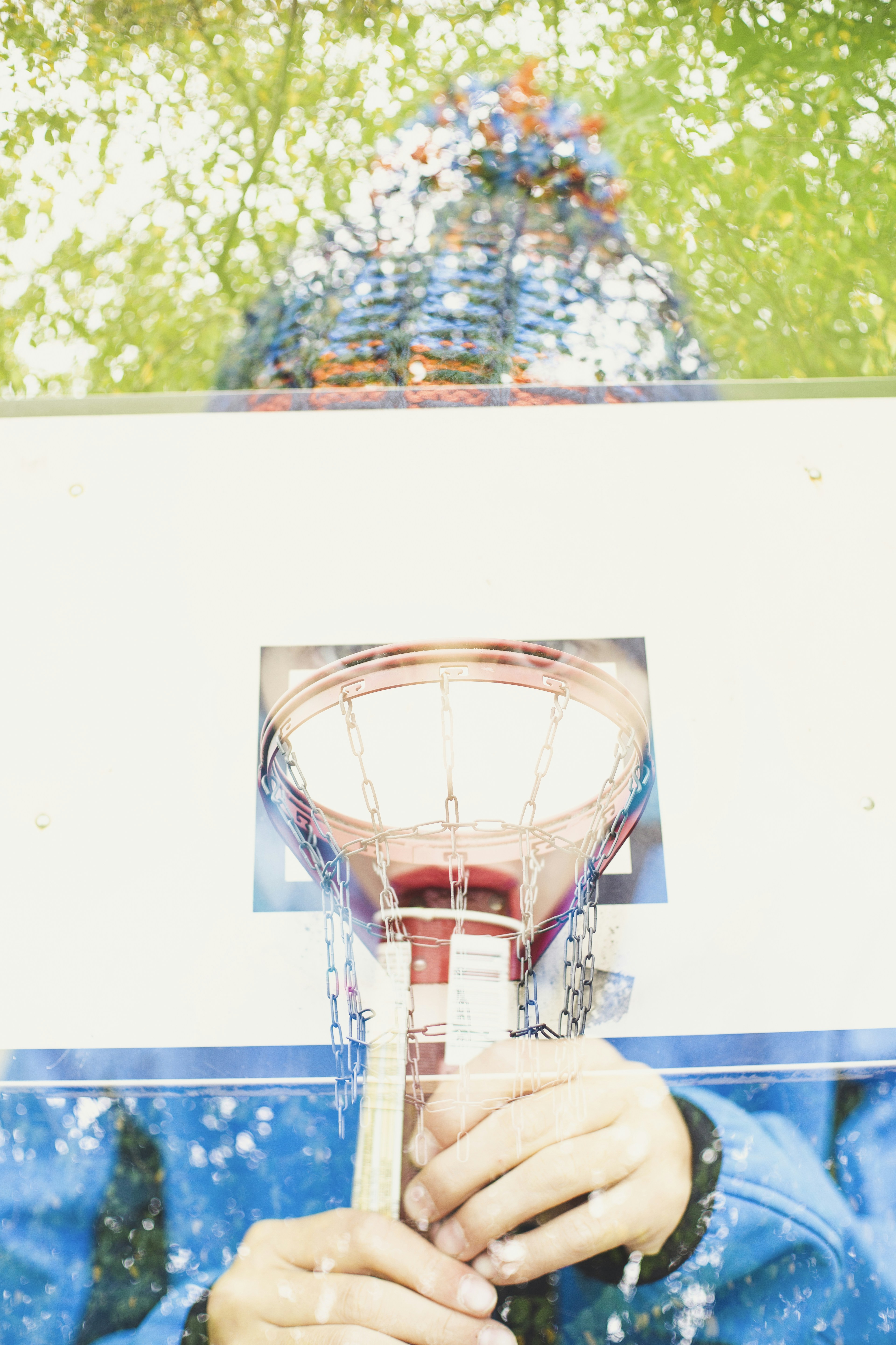 Basketball Hoop Portrait Through Glass: A Playful Self-Study in Reflections