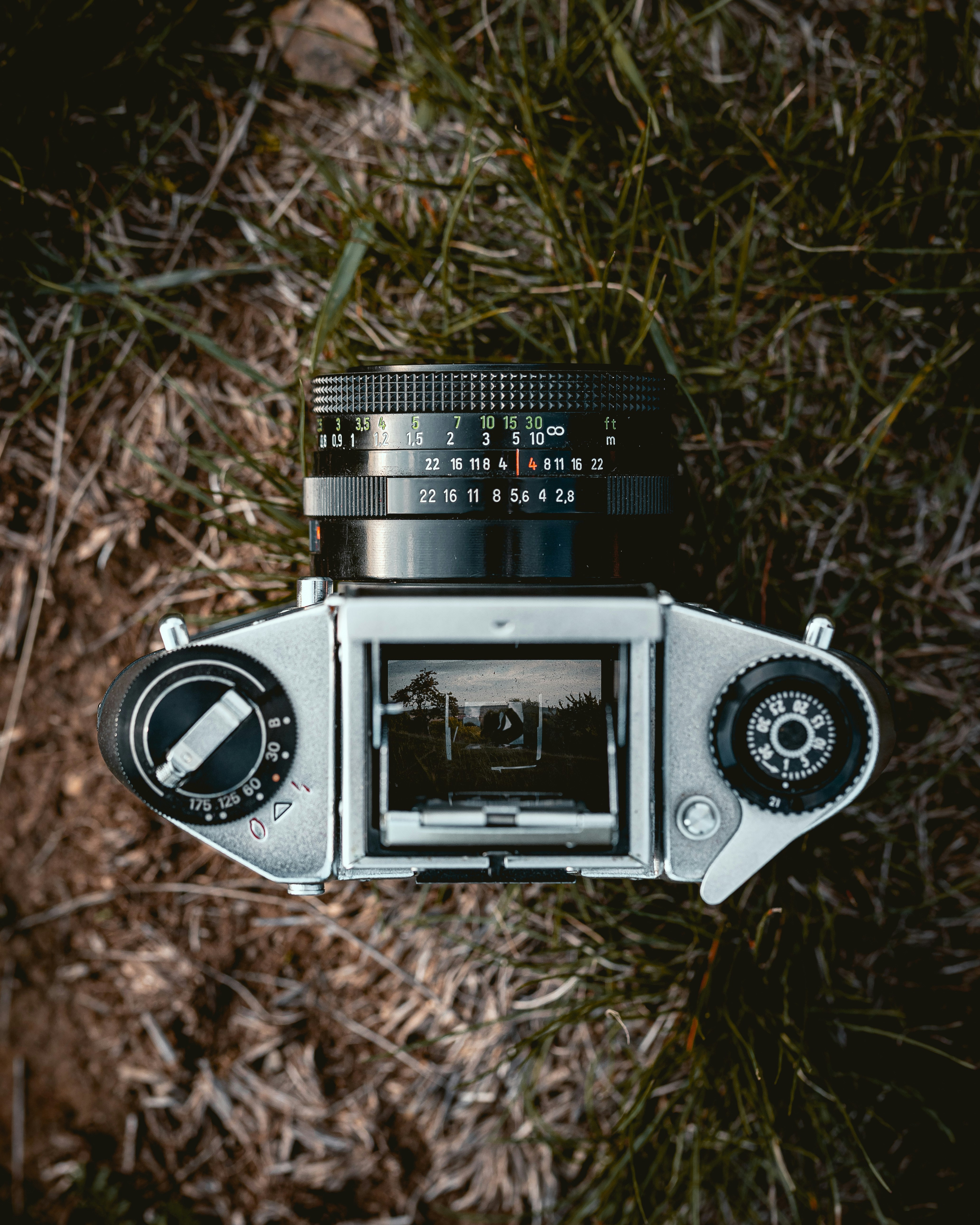 Black and gray DSLR camera on grass field photo – Free Grey Image on ...