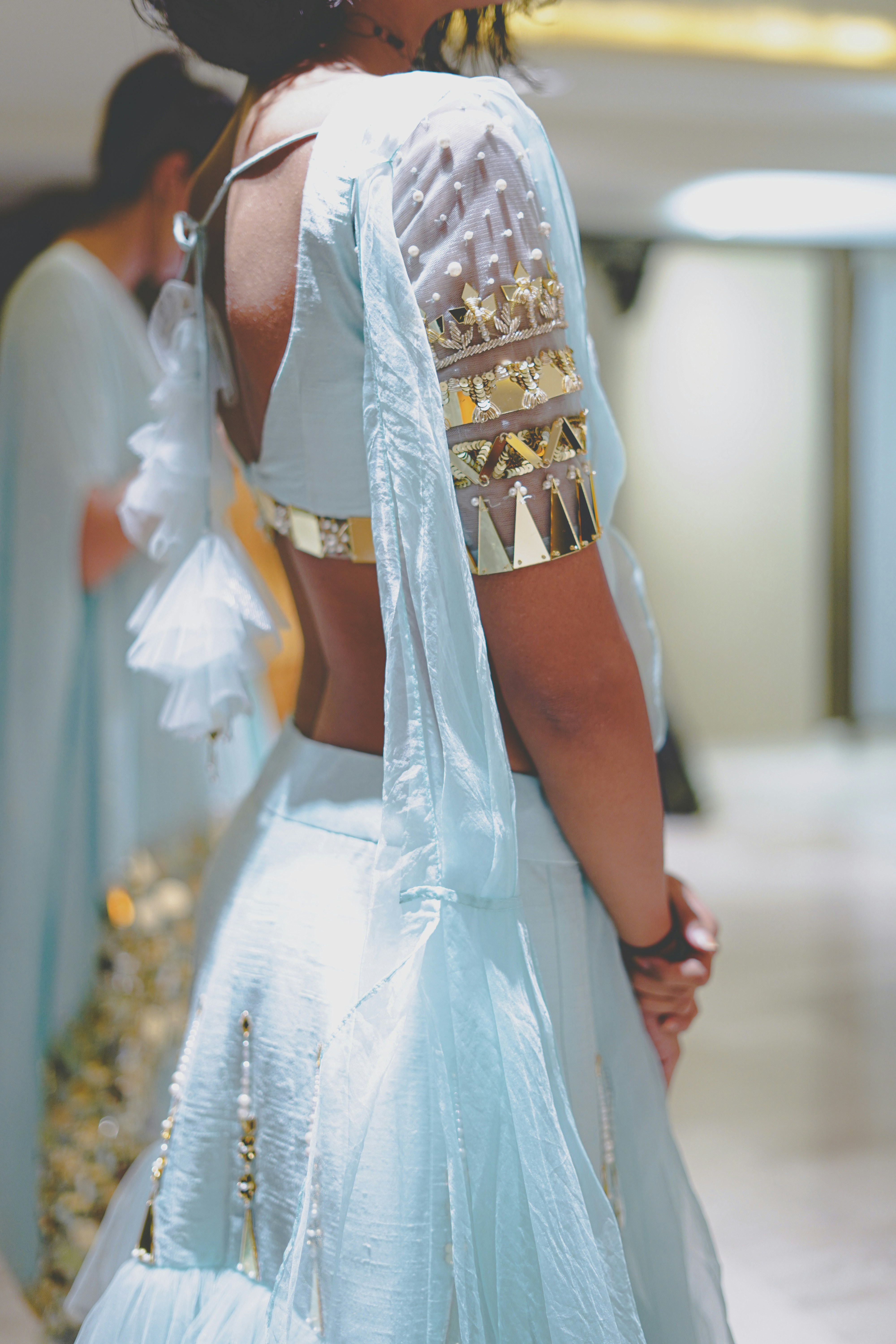 Pastel runway: a backlit moment in mint and gold