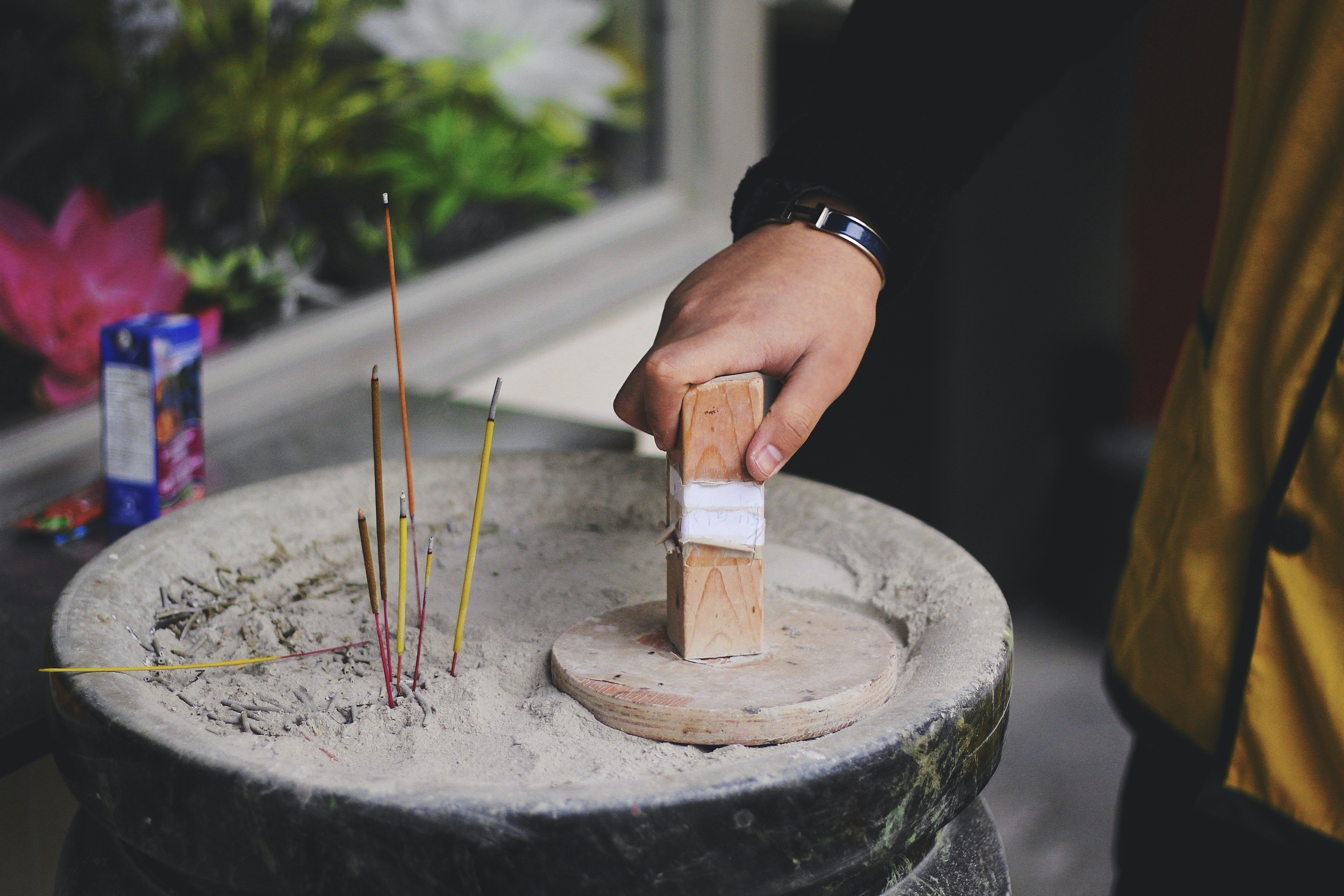 Brick Stack Ritual Over a Charred Drum