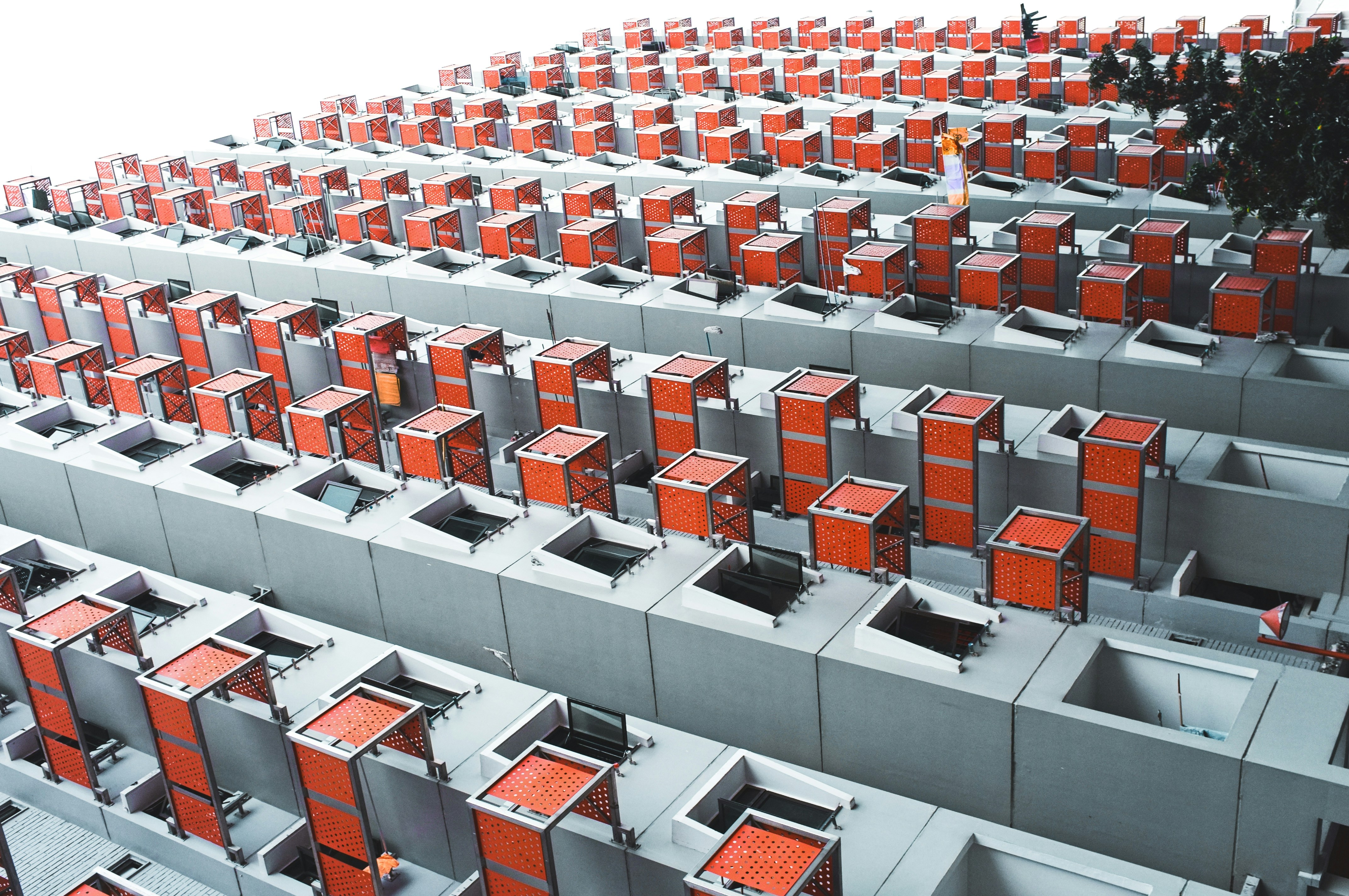 Red and gray high-rise building photo – Free Abstract Image on Unsplash