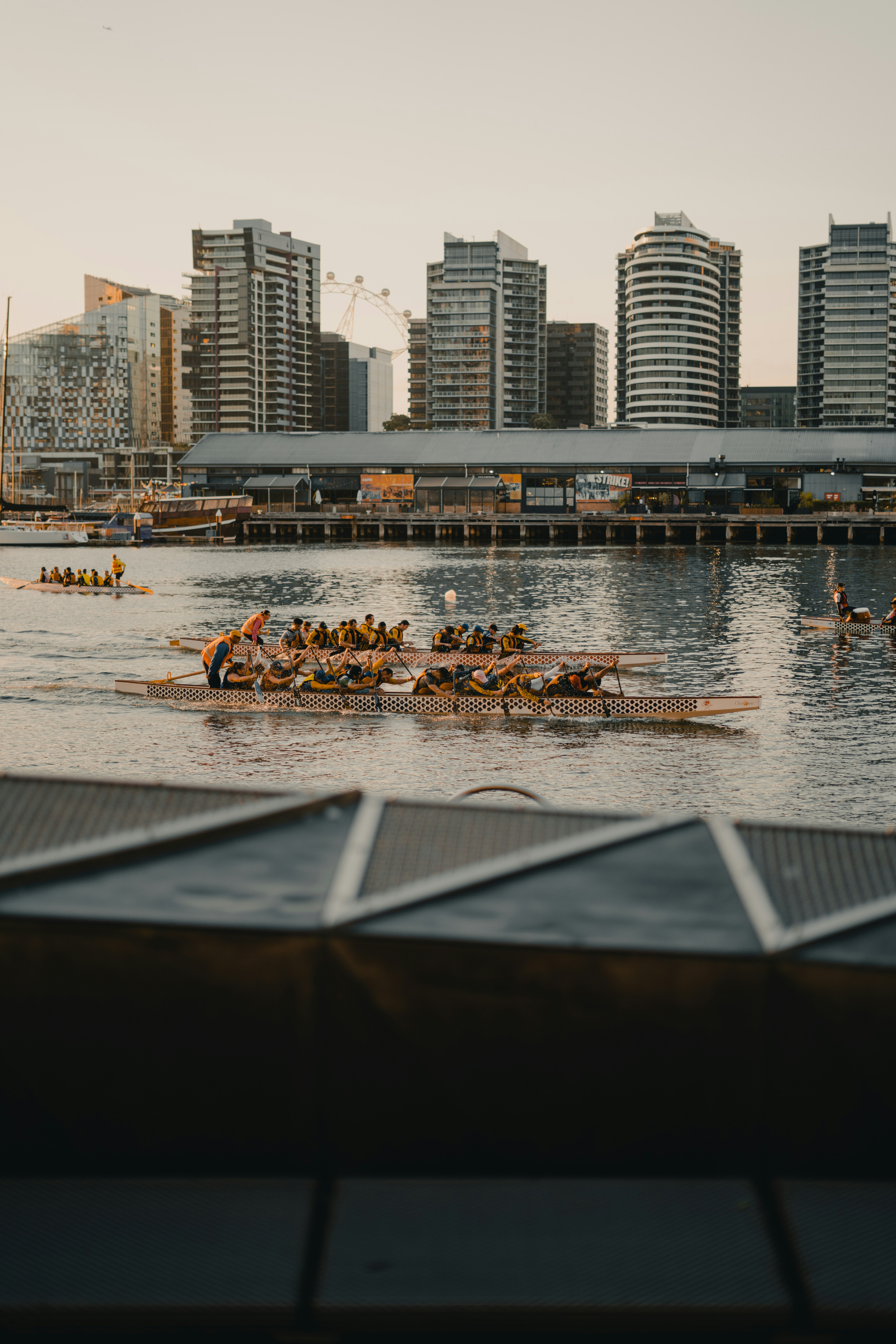 Dragon Boat Parade on Hafenfront: Cityscape Sunset