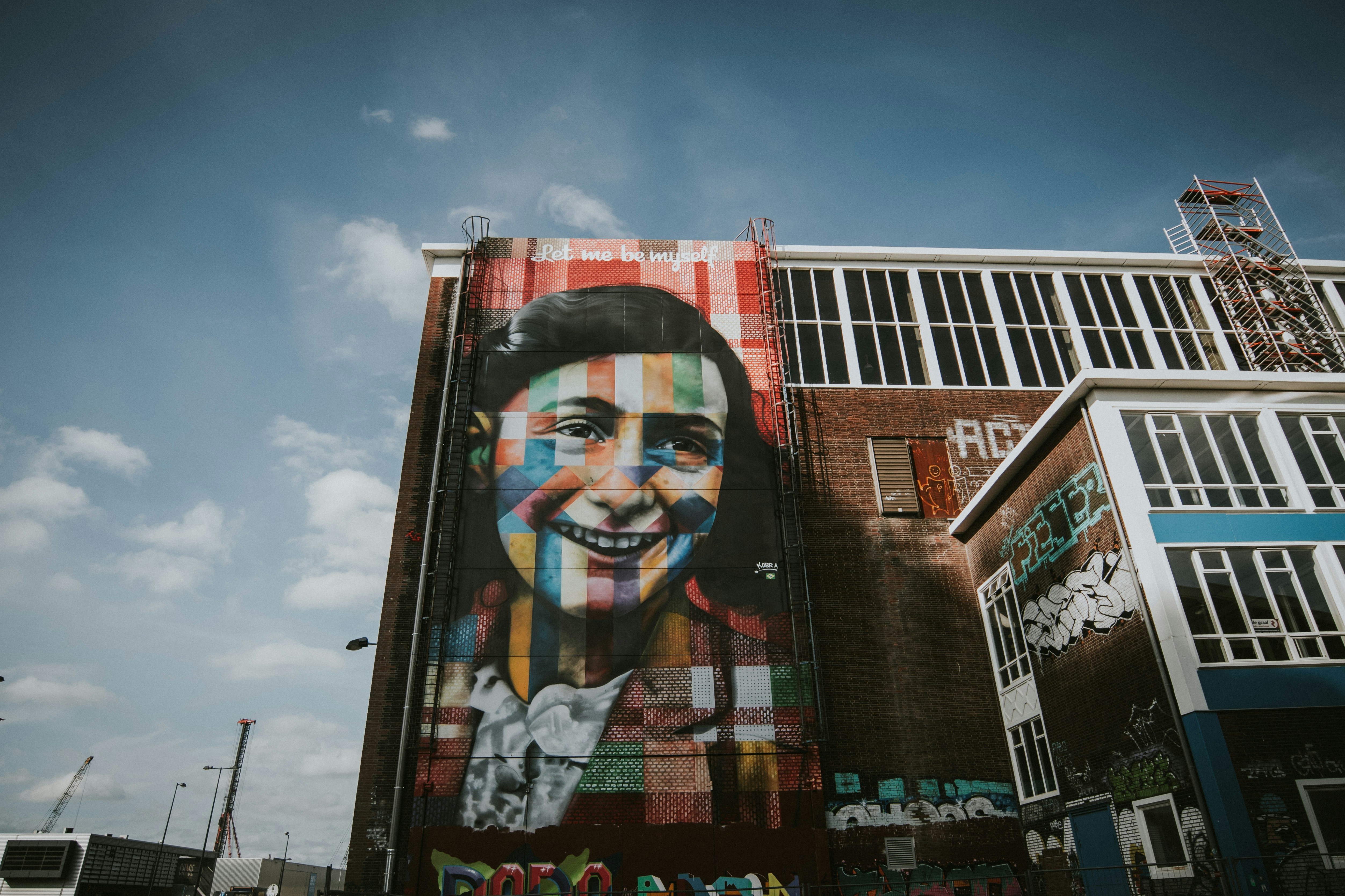 Low-angle photography of assorted-color concrete building photo – Free ...