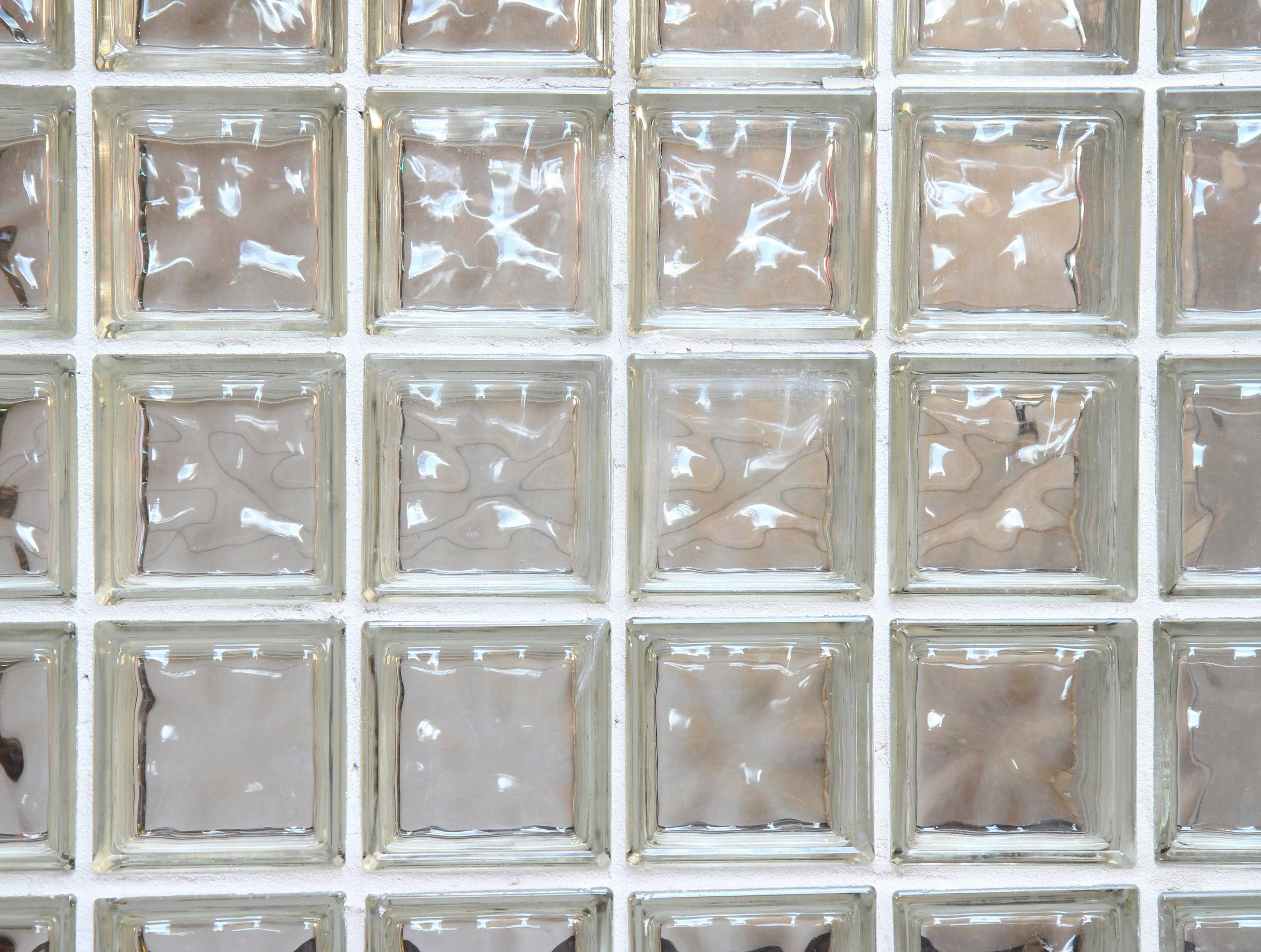 A close up of a glass block wall photo – Free Grey Image on Unsplash