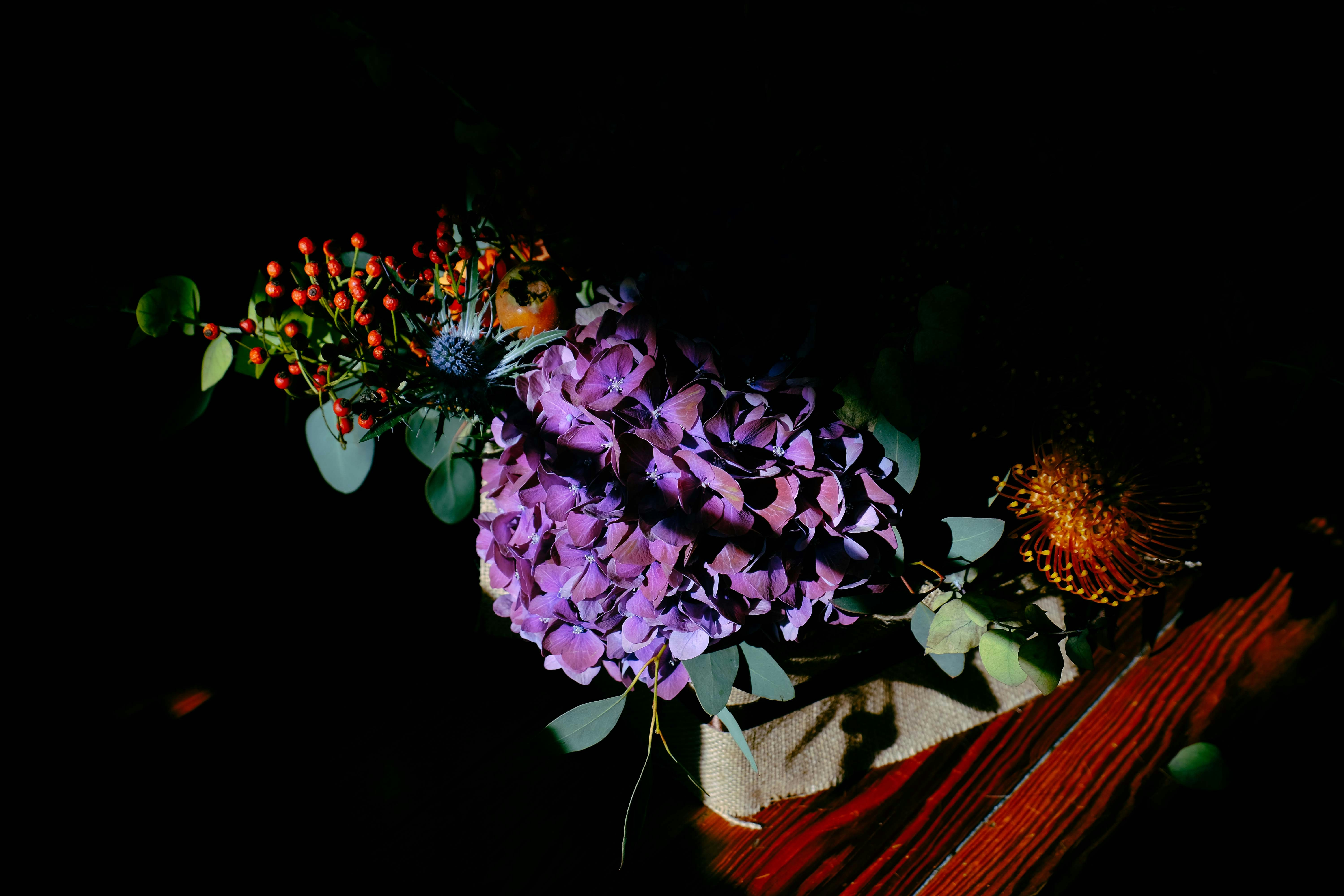 Moonlit Hydrangea & Ember Berries: A Quiet Floral Moment on Wood