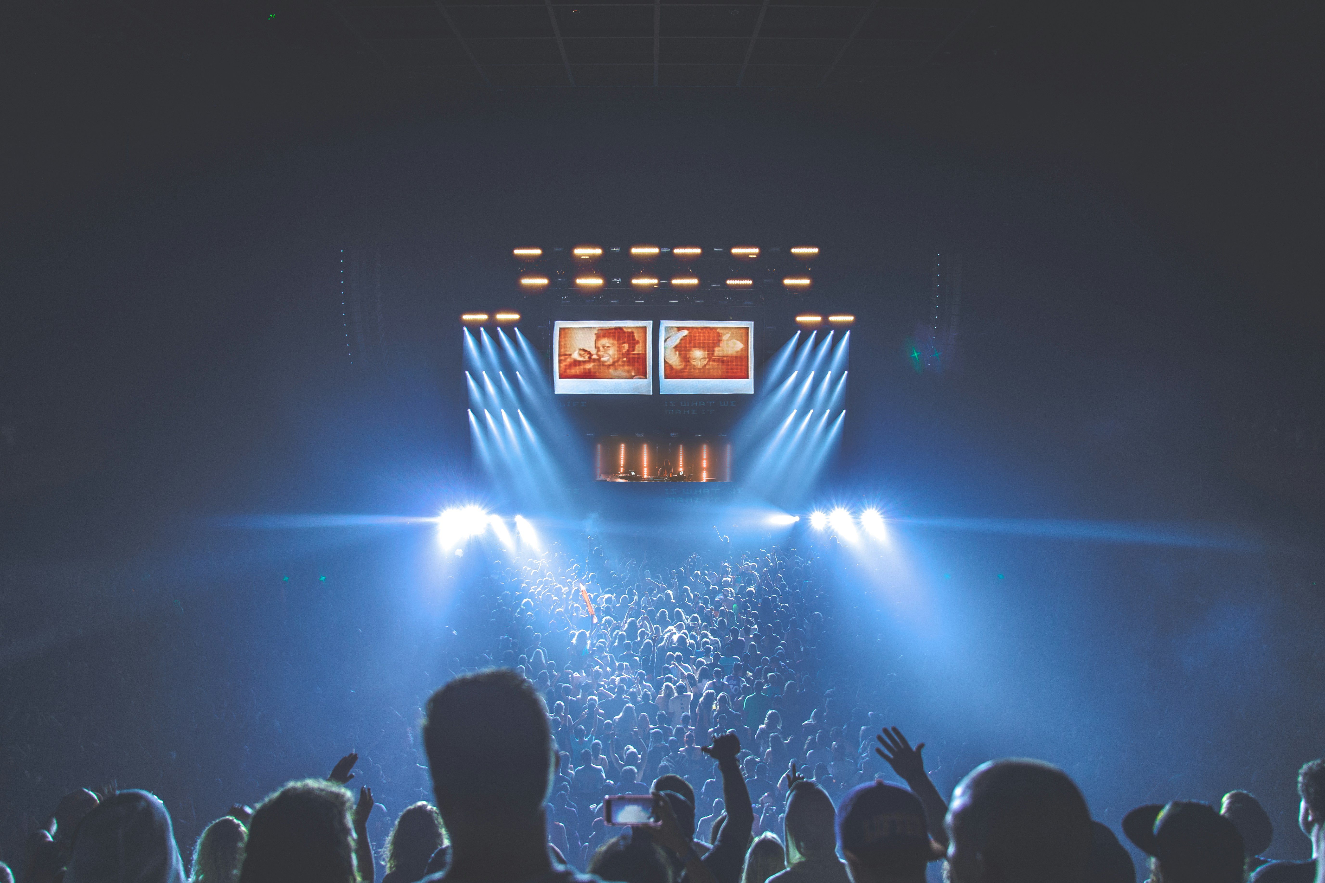 People under blue lights photo – Free Blue Image on Unsplash