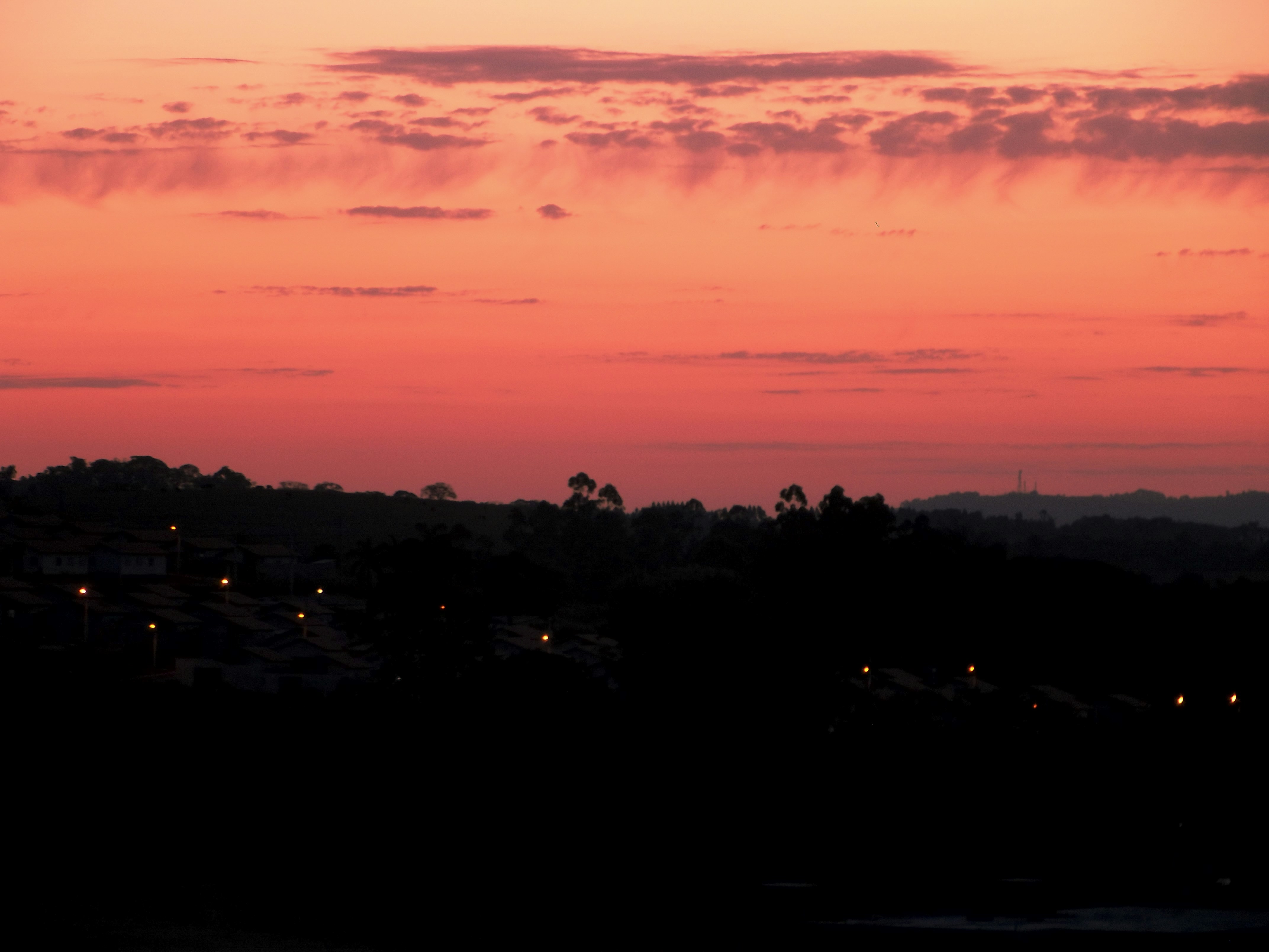 Crimson Horizon Over the Silhouetted Ridge