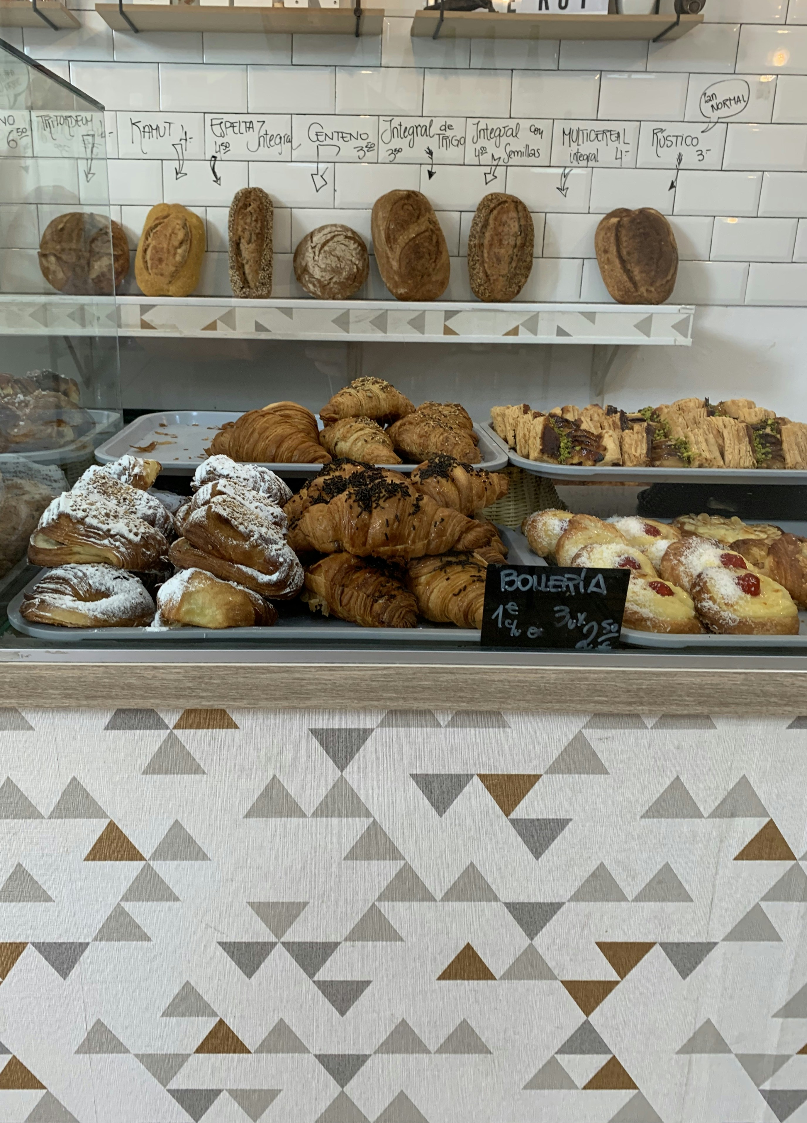 Crusts and Croissants: A Quiet Bakery Display in Morning Light