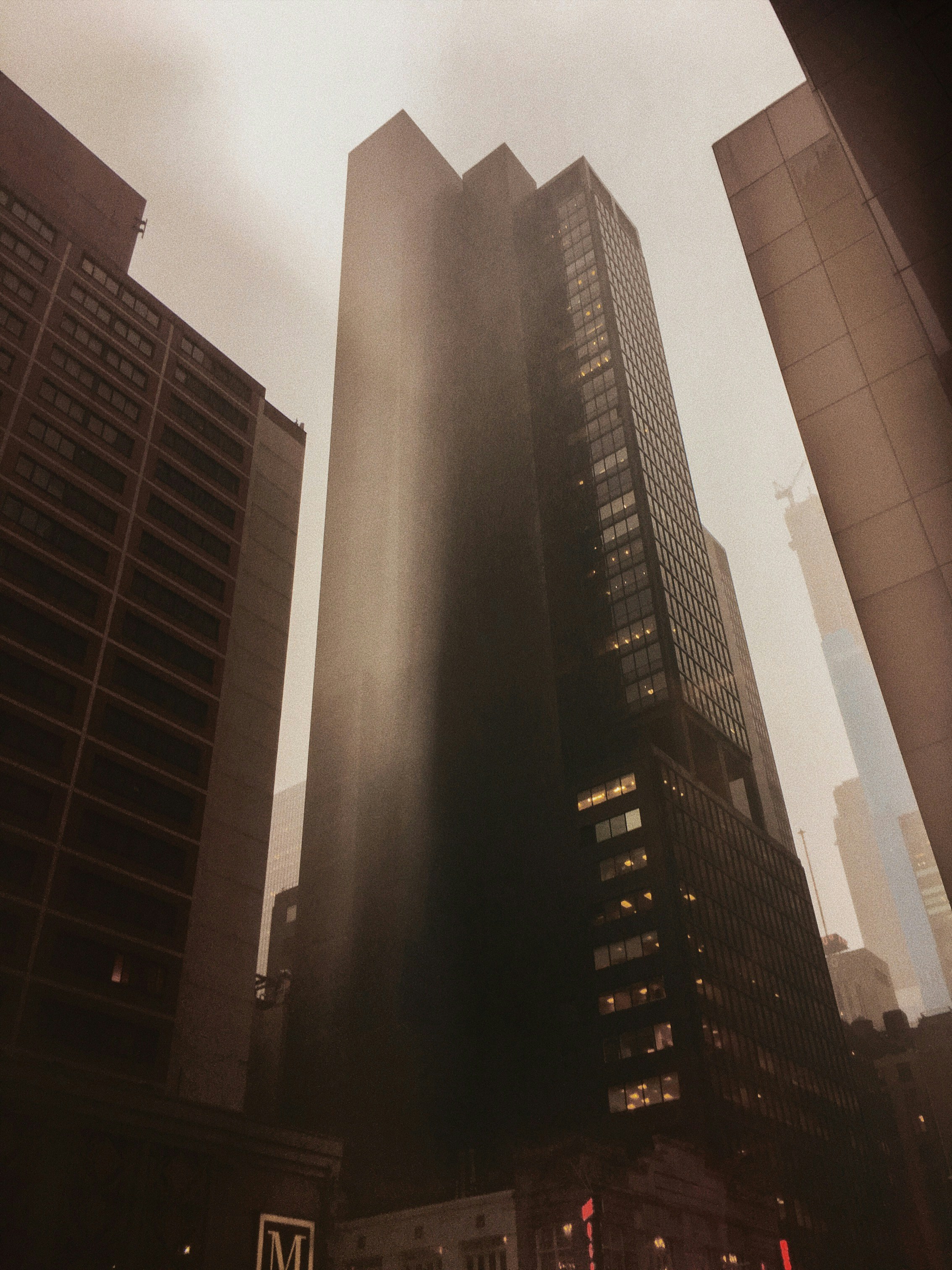 Sepia Skyline: Vertical Giants in a Quiet Haze