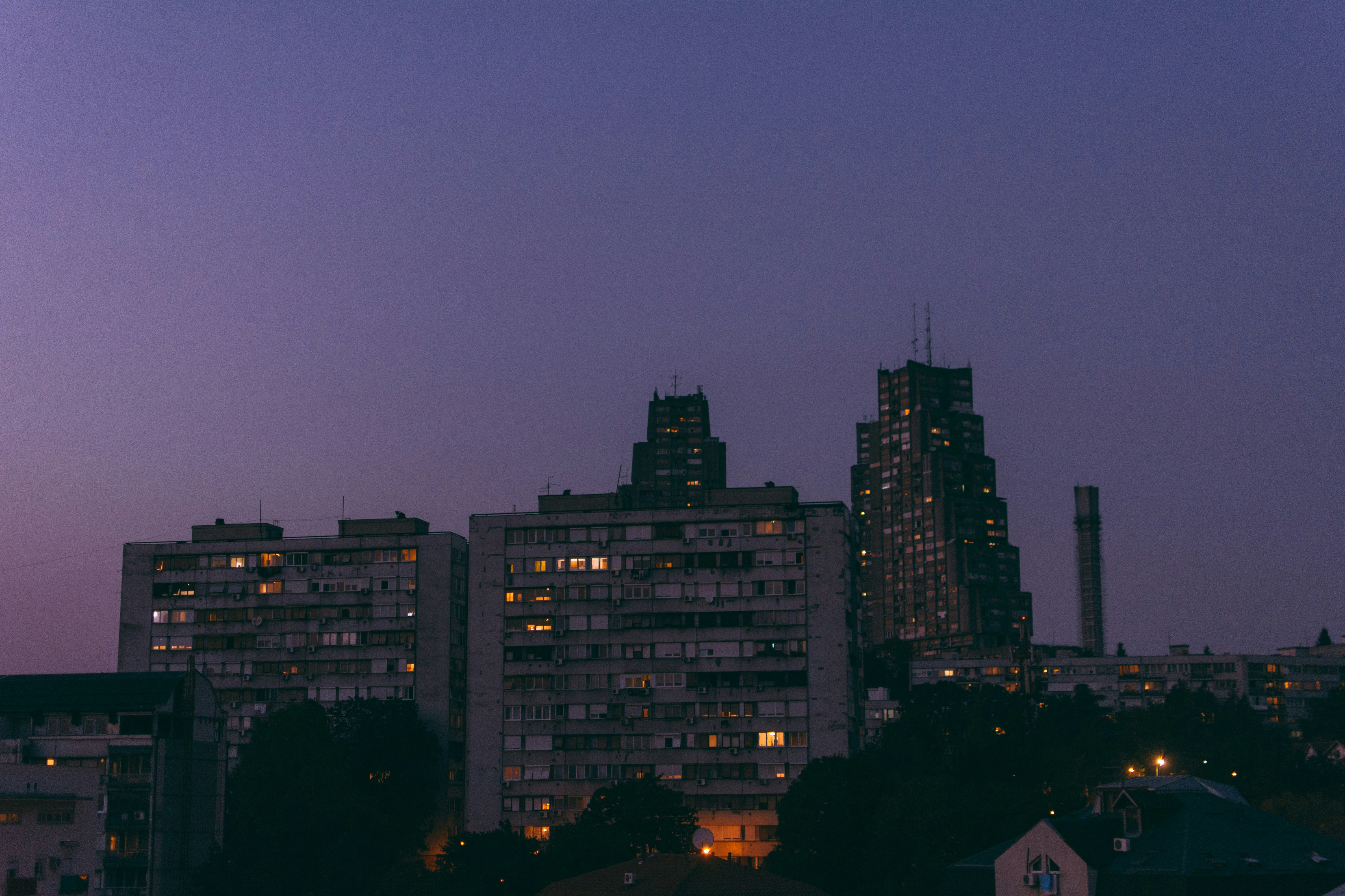 City with high-rise buildings during night time photo – Free Grey Image ...