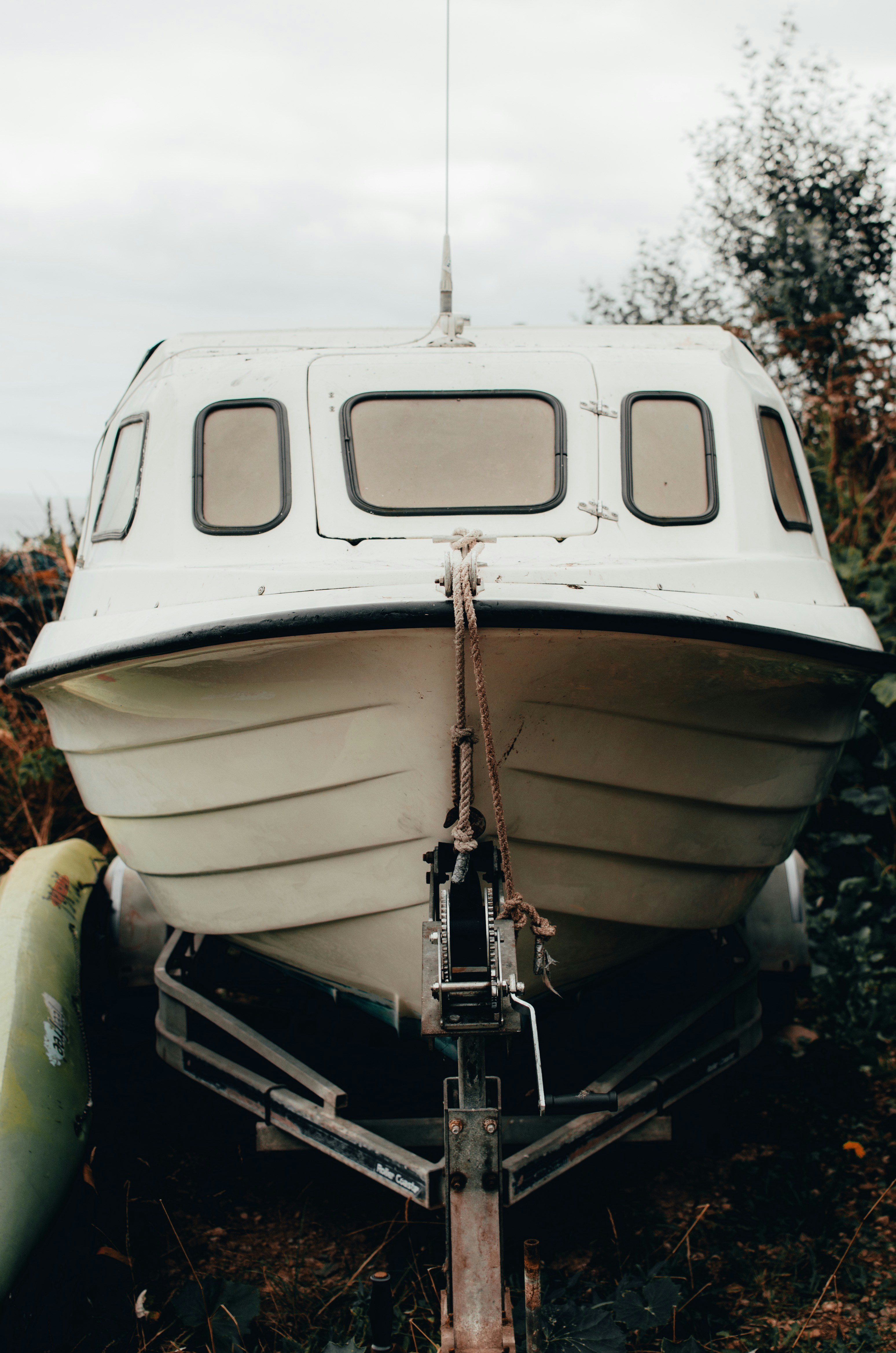 Docked Vessel in a Quiet Dry Dock: A Weathered Boat Ready for Its Next Voyage