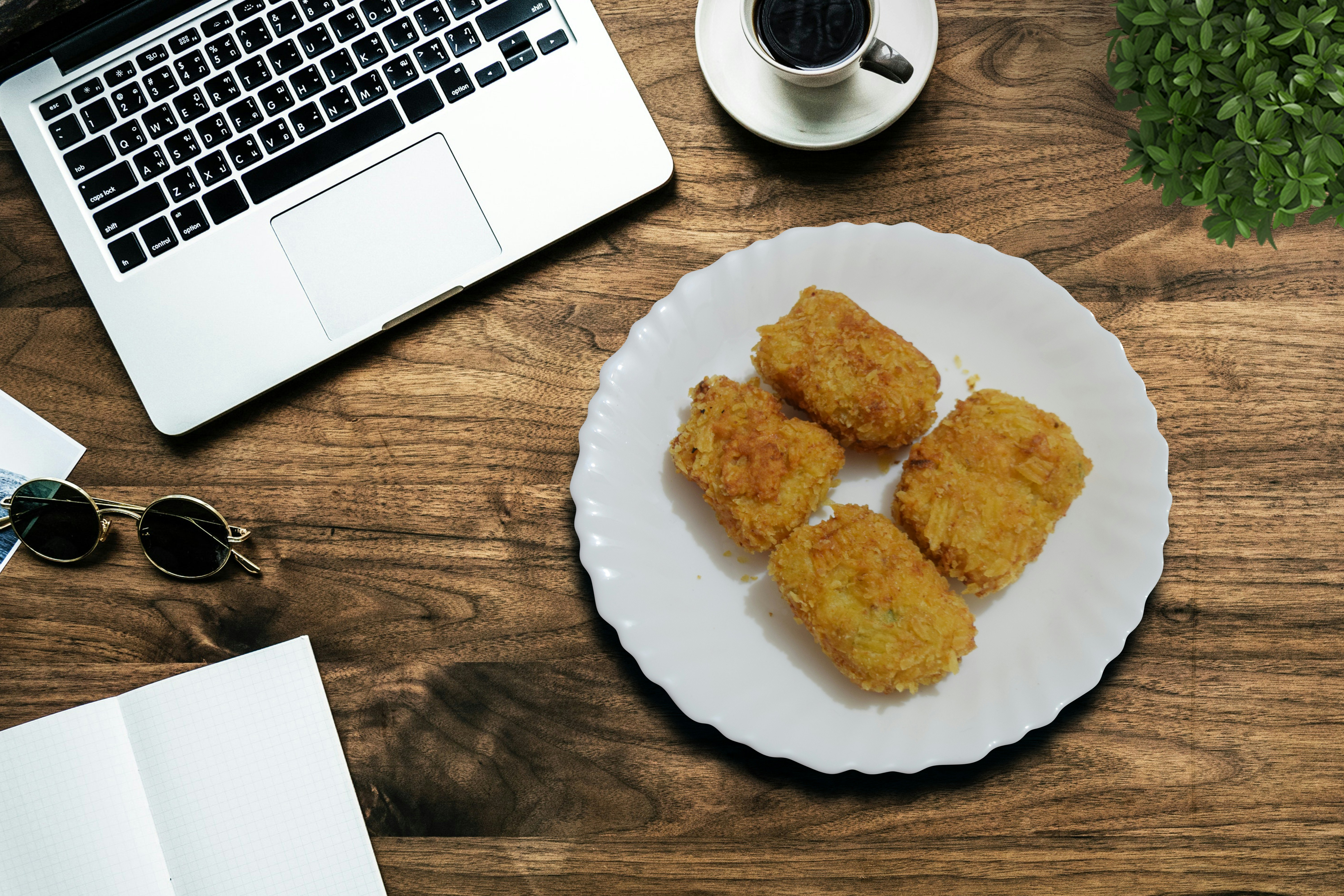 Golden Croquettes on a Wooden Desk: A Quiet Snack Still Life