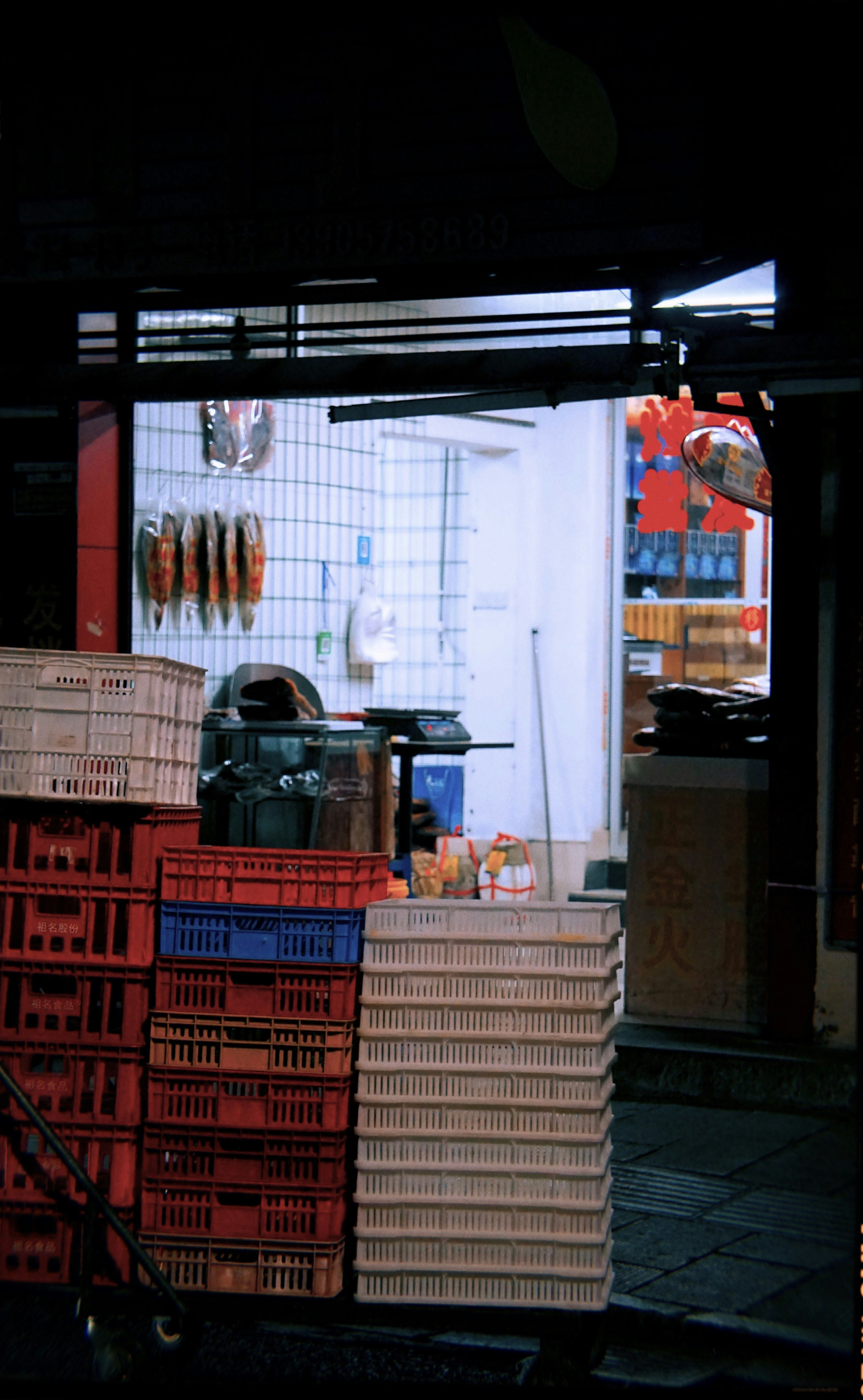 Crates and Light: A Market Threshold Framed in Color