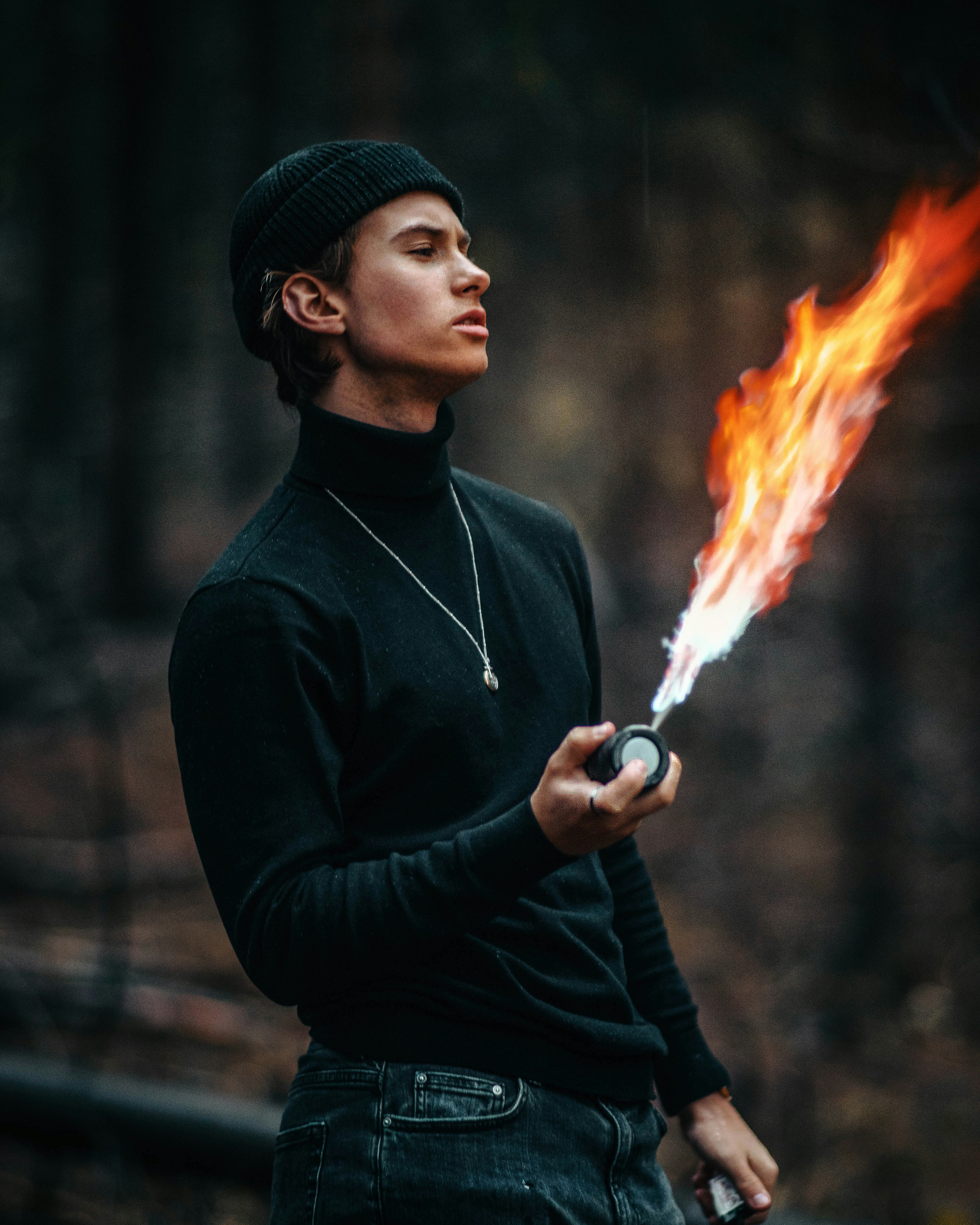 Man holding torch on selective focus photography photo – Free Black ...