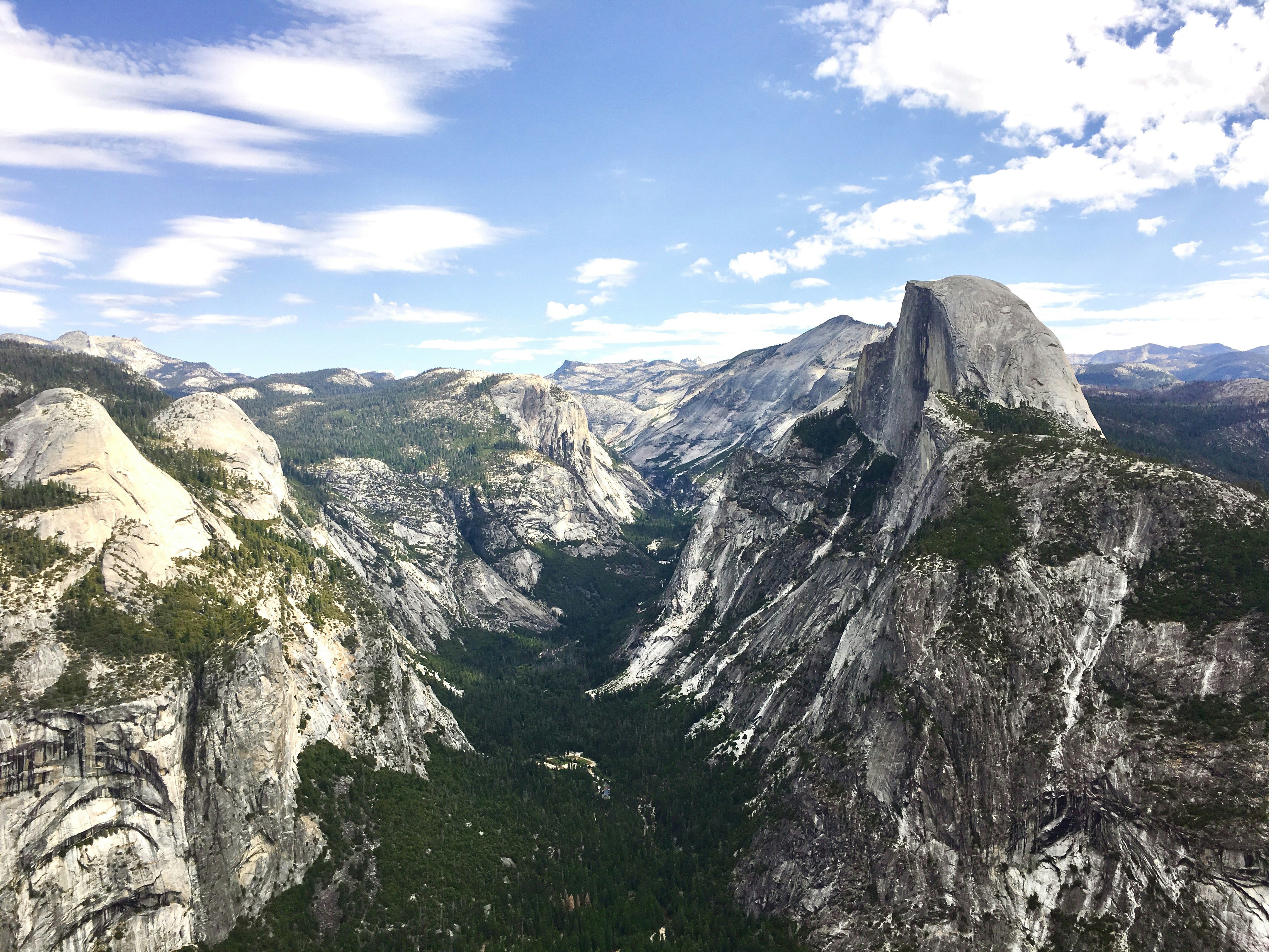 Granite Cathedral Over the Valley: A Skyward Panorama