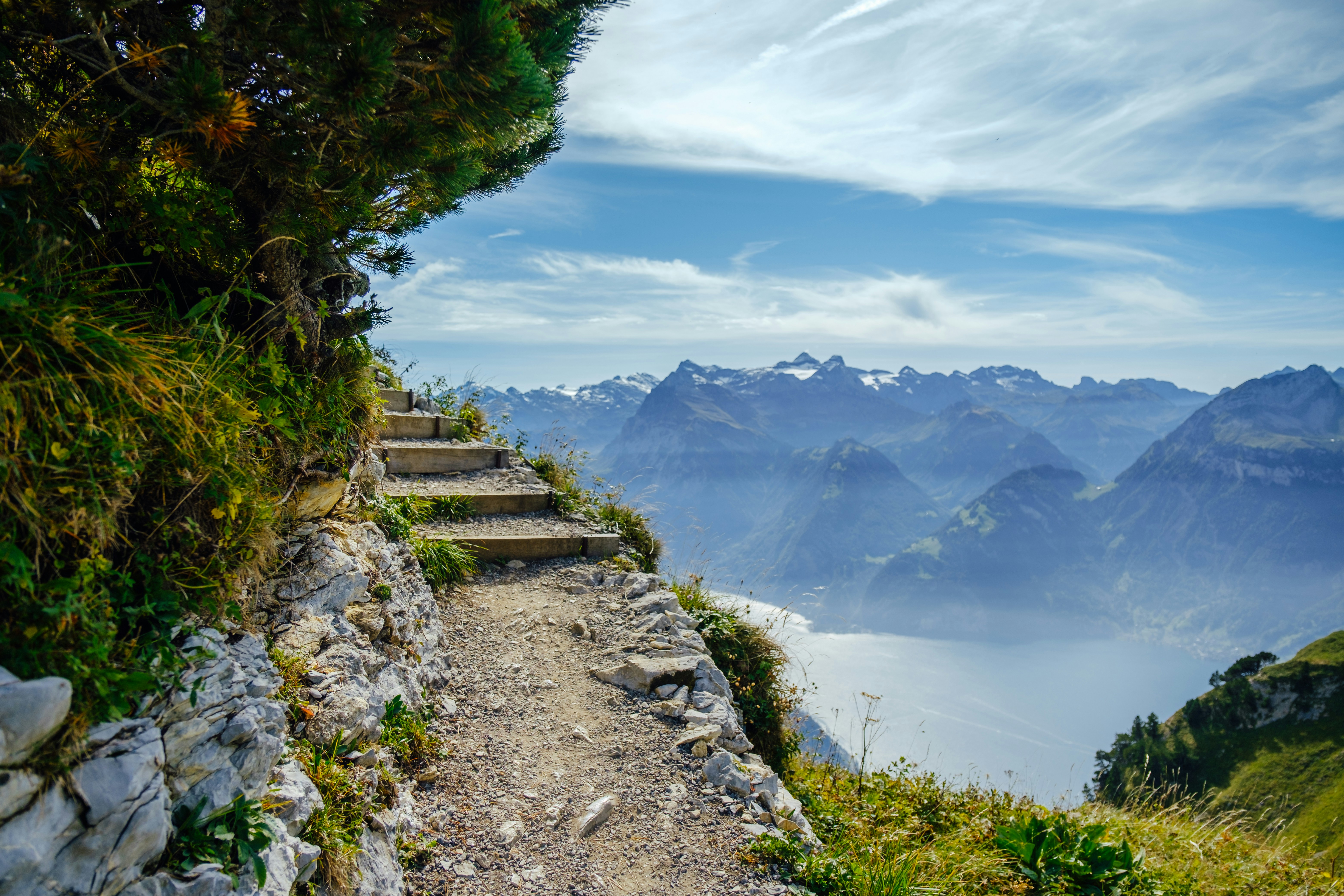 Ridge Path to the Sky Over a Mountain Lake