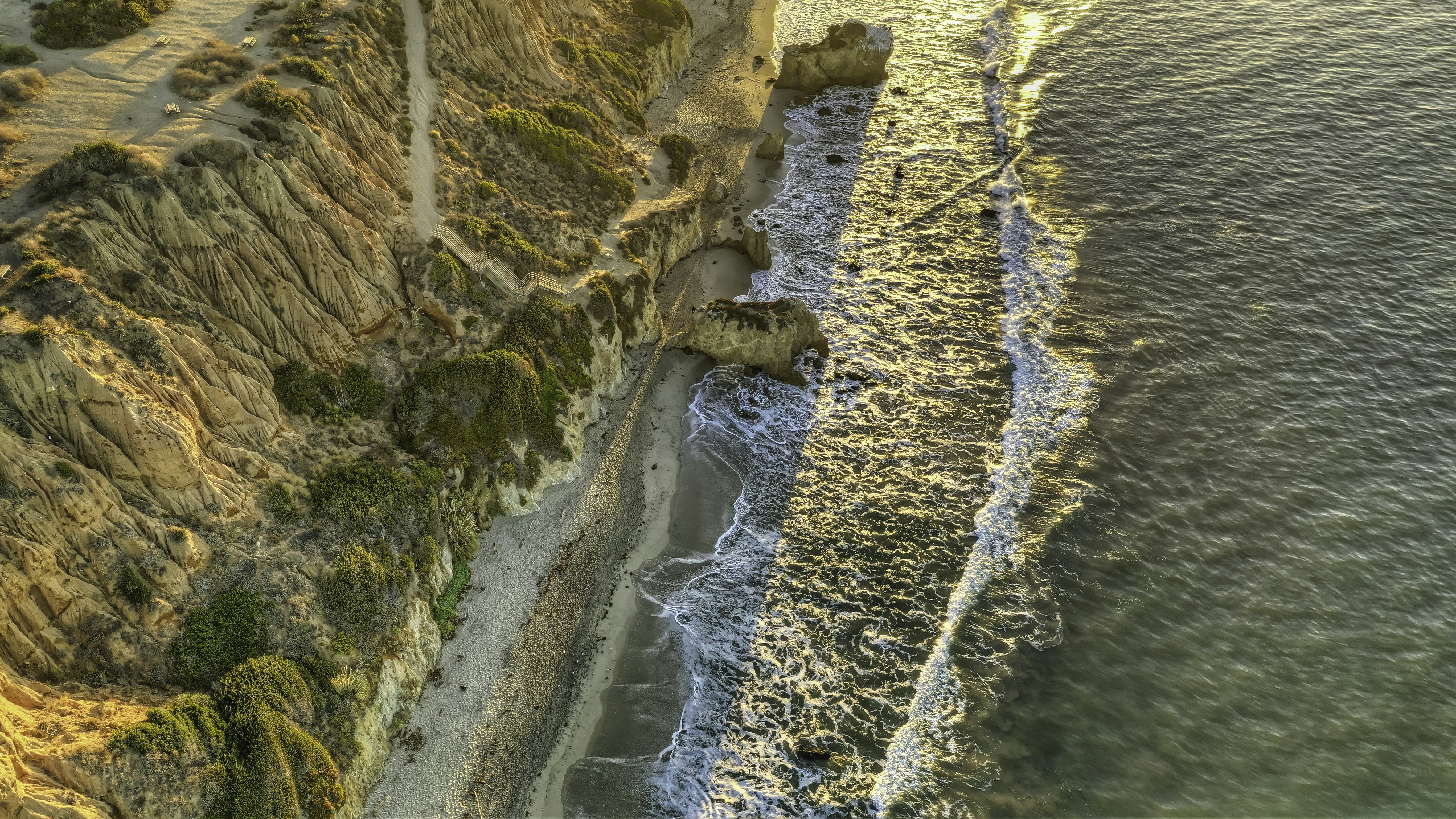 Aerial view of cliff facing ocean photo – Free Nature Image on Unsplash