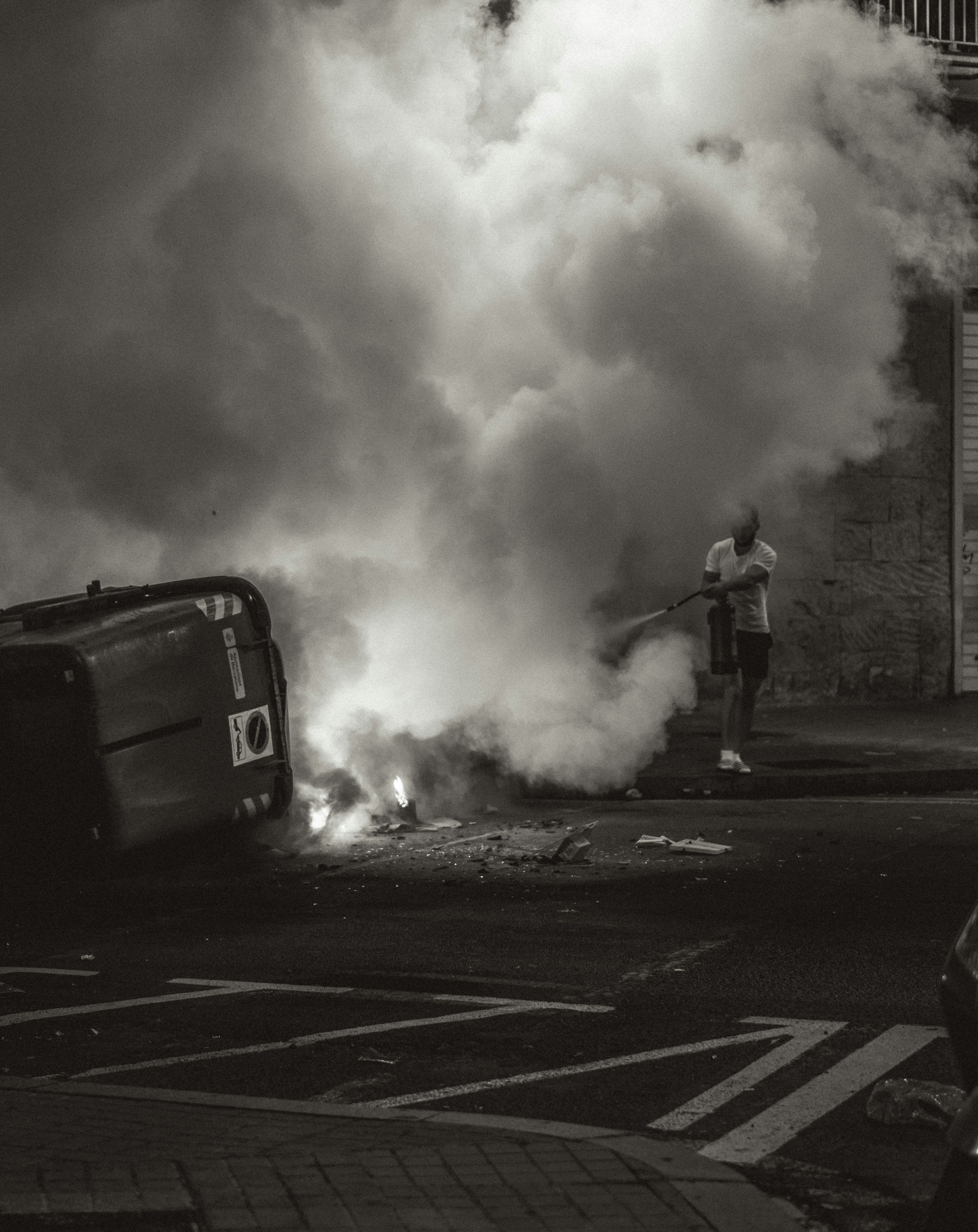 Smoke and Streetlight: A Quiet Moment Beside the Fire