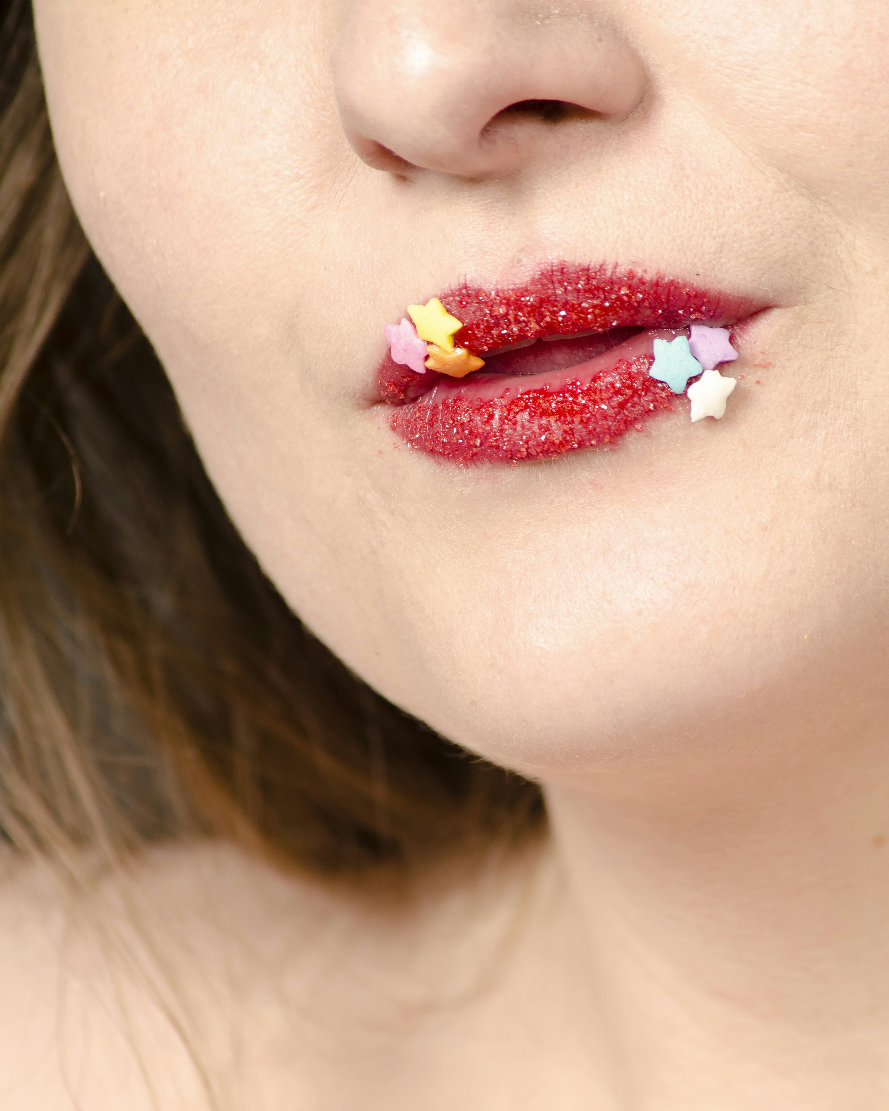 Sugary Lip Art: Colorful Confetti on a Soft Smile