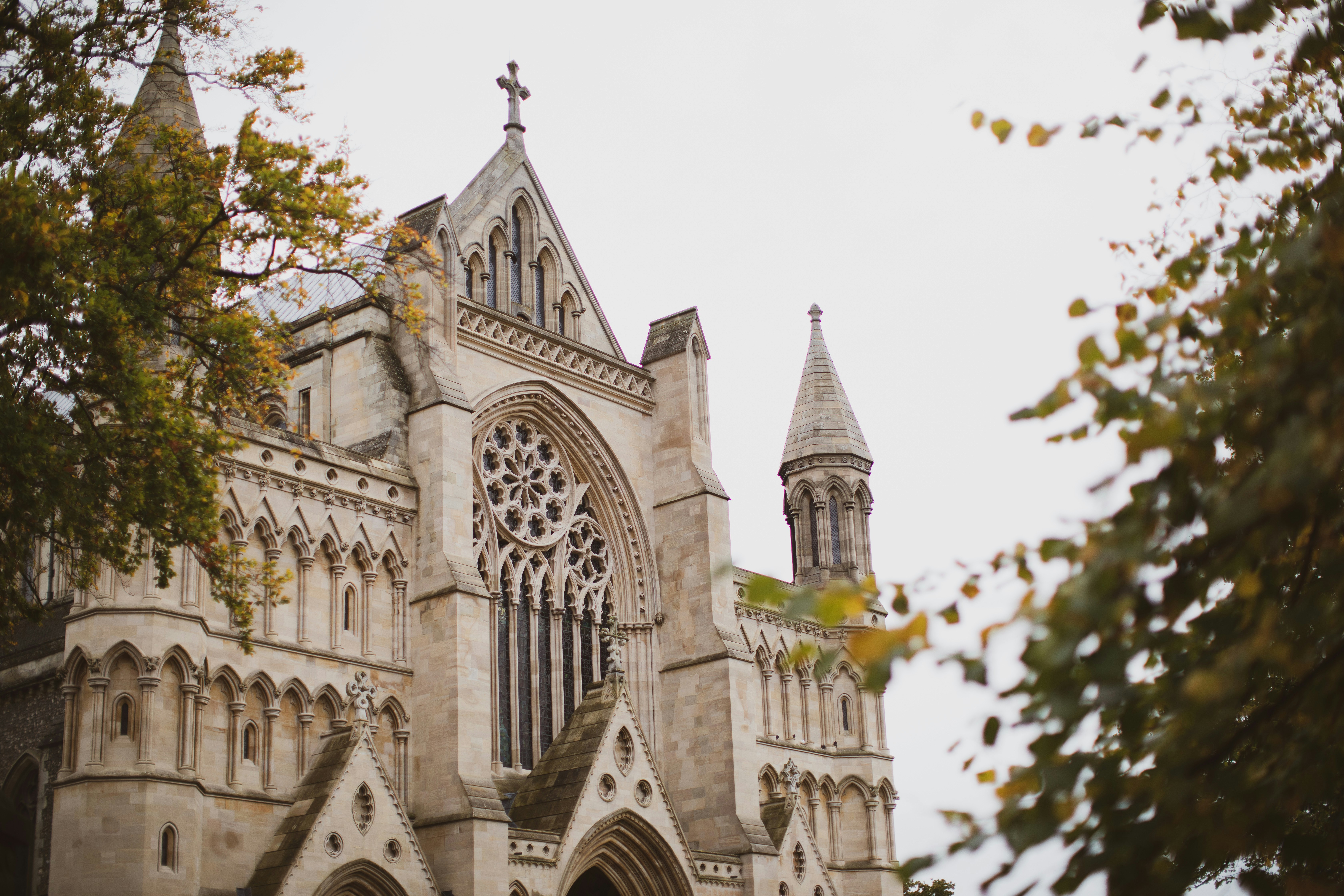 Selective focus photography of white concrete church during daytime ...