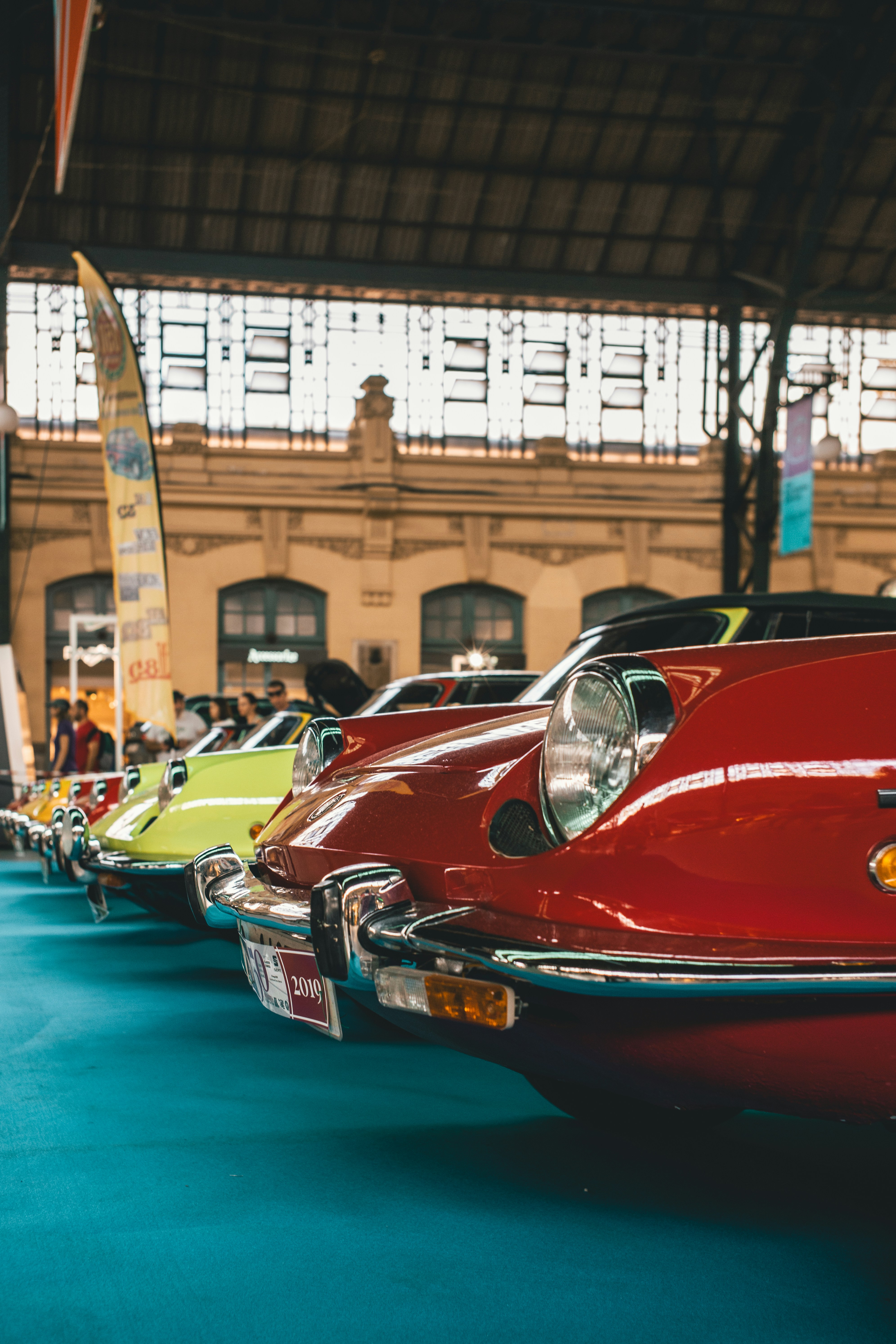 Crimson in Chrome: A Red Classic Anchors a Row of Vintage Showcars
