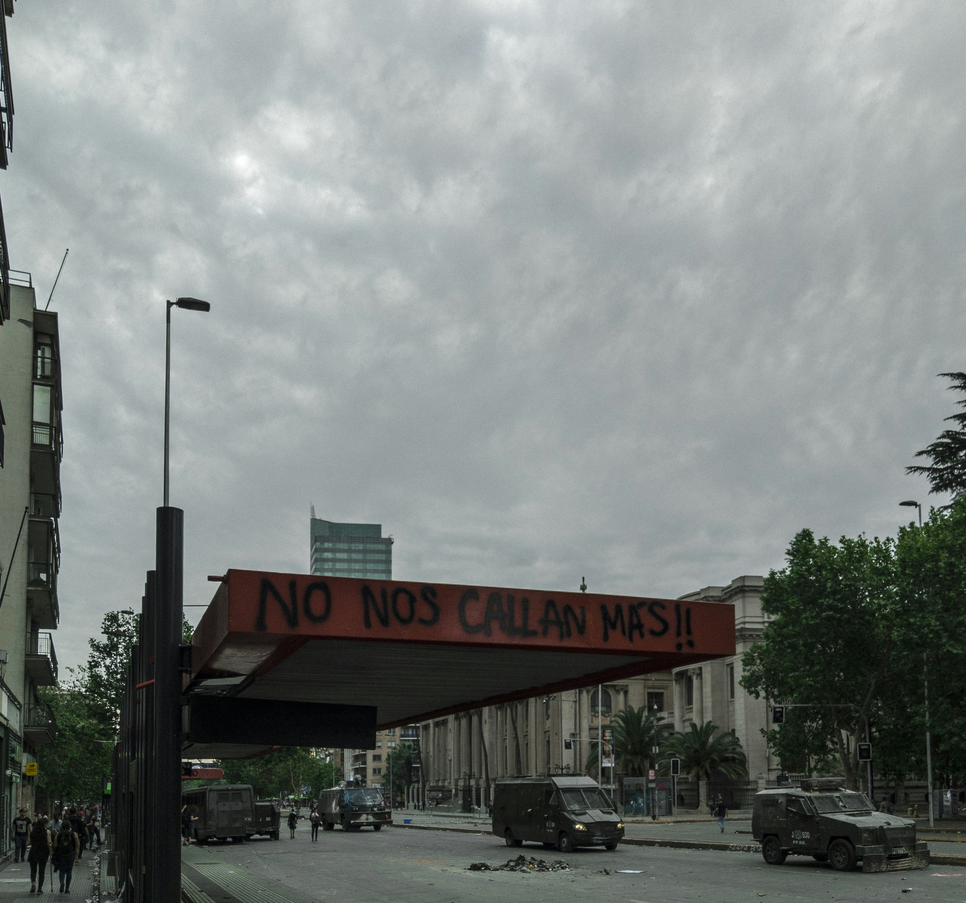"We won't be quiet again" Praise a vandalized bus stop, as results of the massive protests that were taking place in Santiago de Chile in October of 2019.