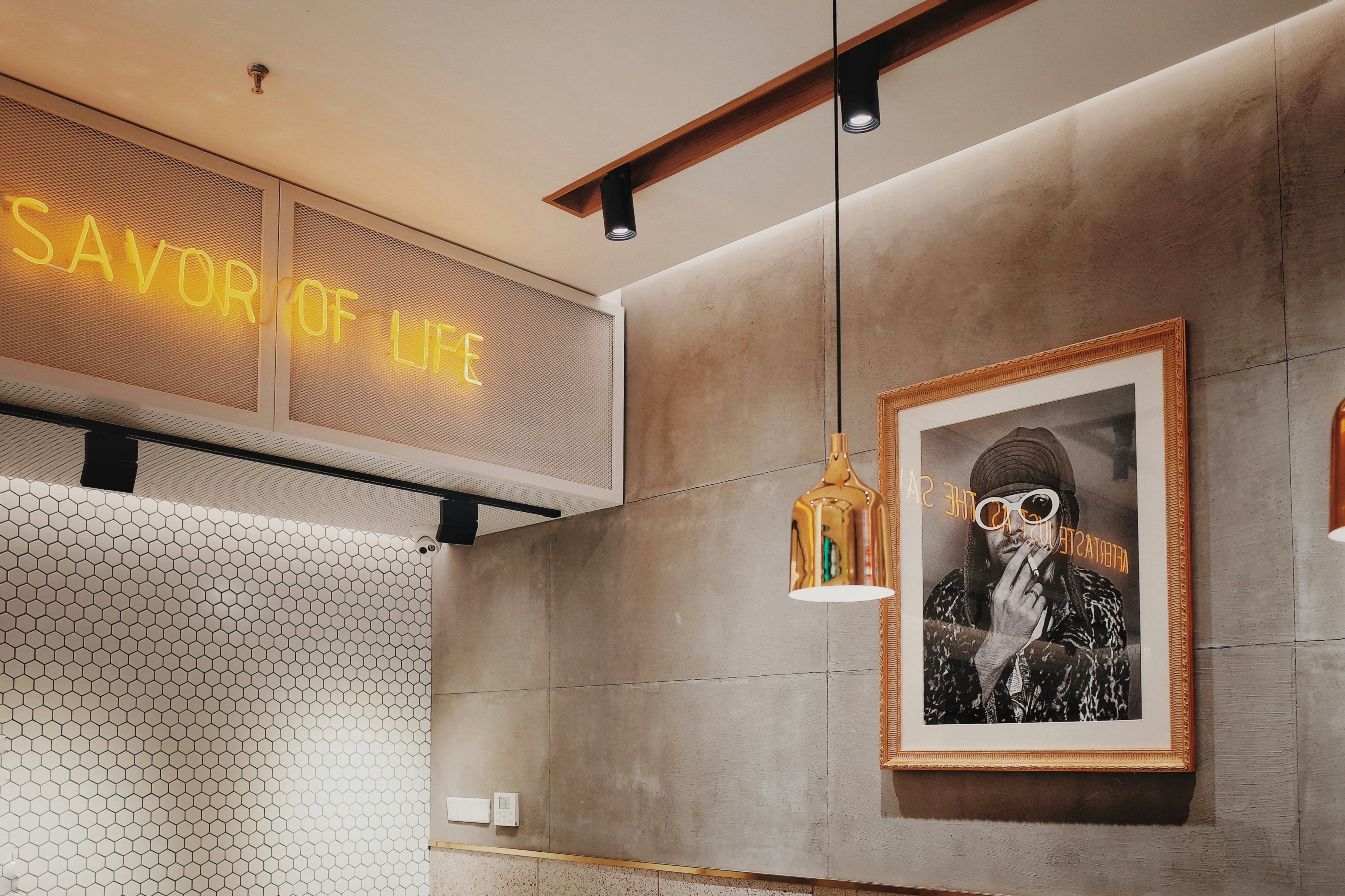 Neon Sighs and Framed Style in a Modern Café